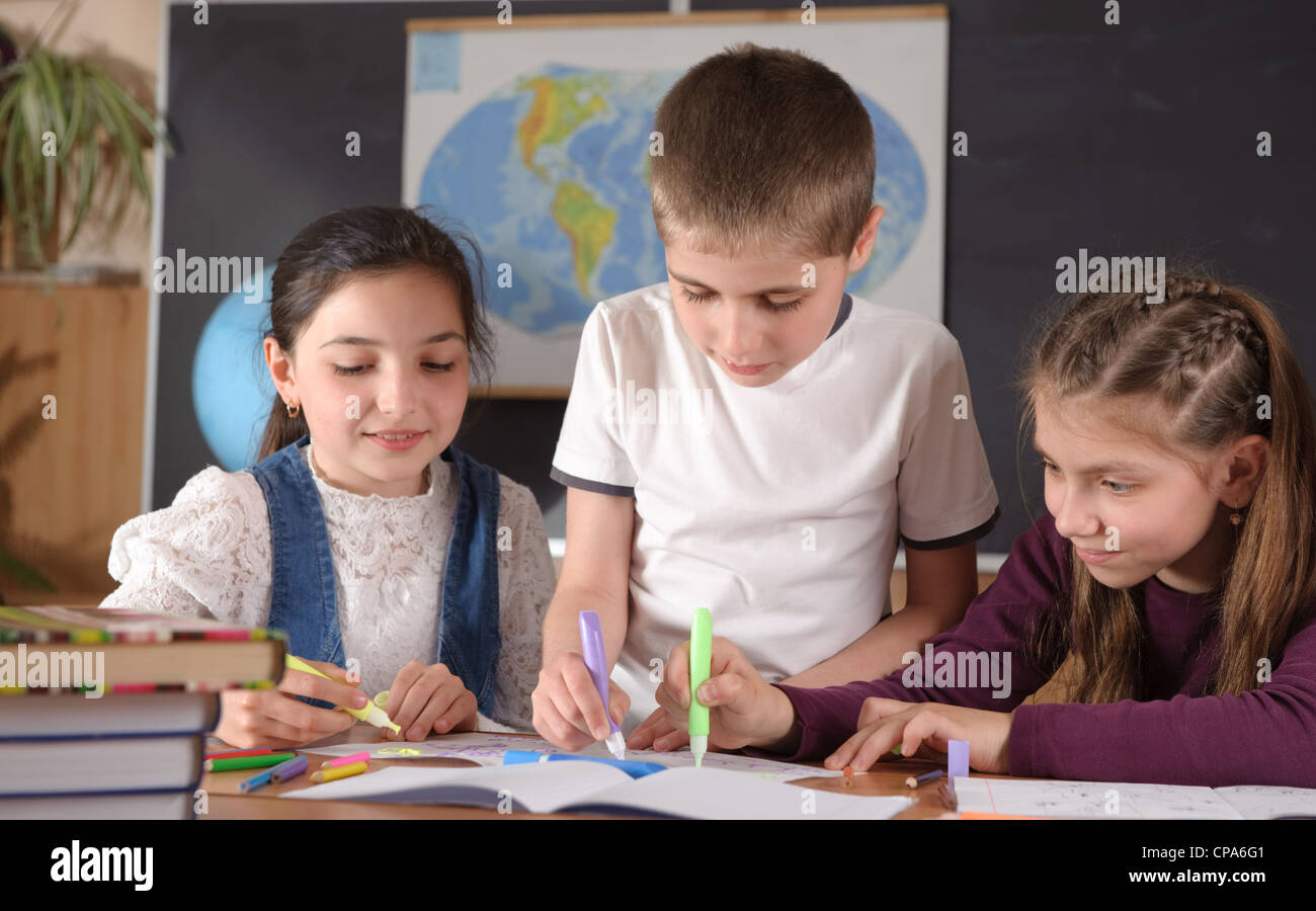 Group of pupils aged 11 study at classroom Stock Photo - Alamy