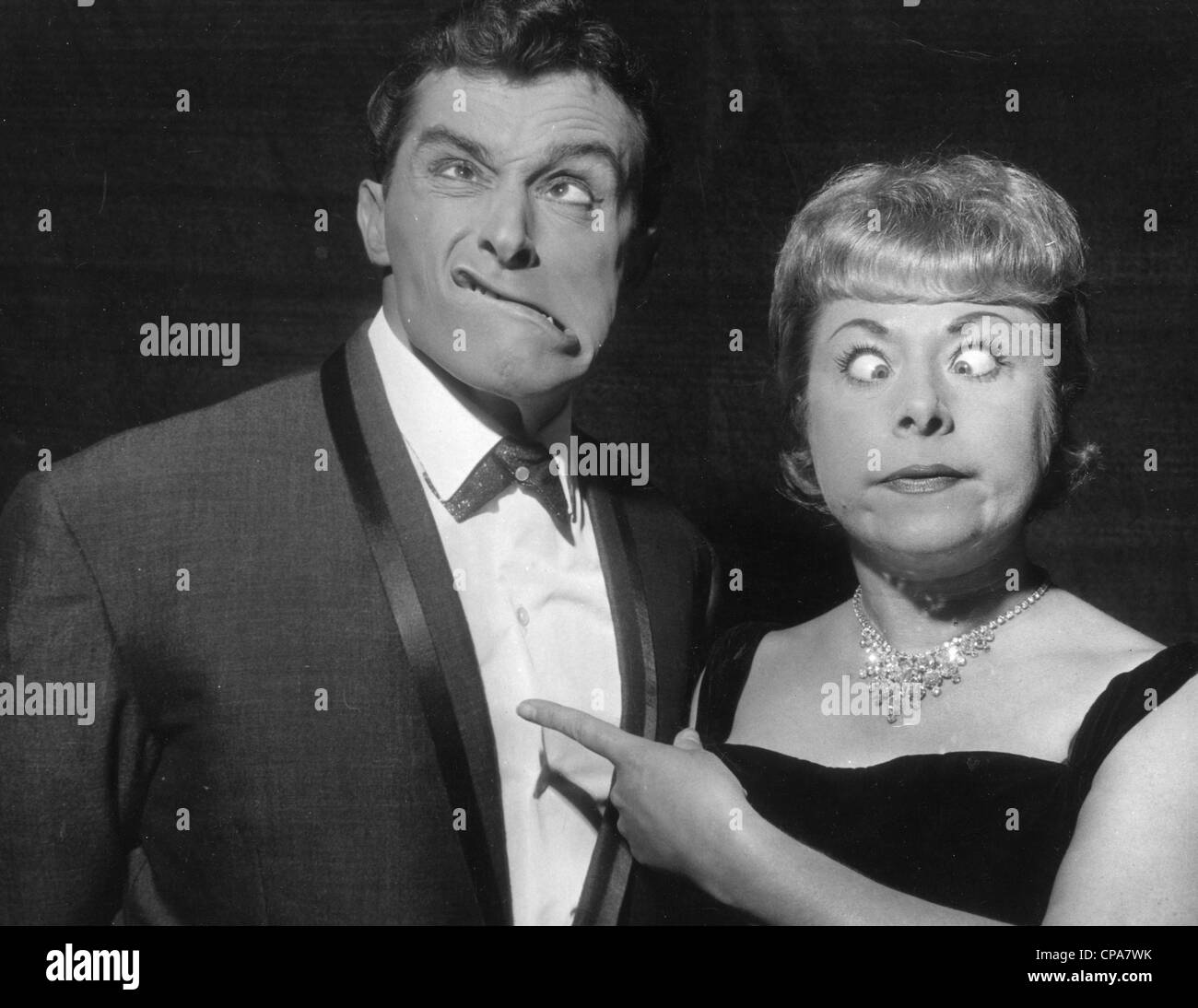 GURNING Couple pulling funny faces Stock Photo - Alamy