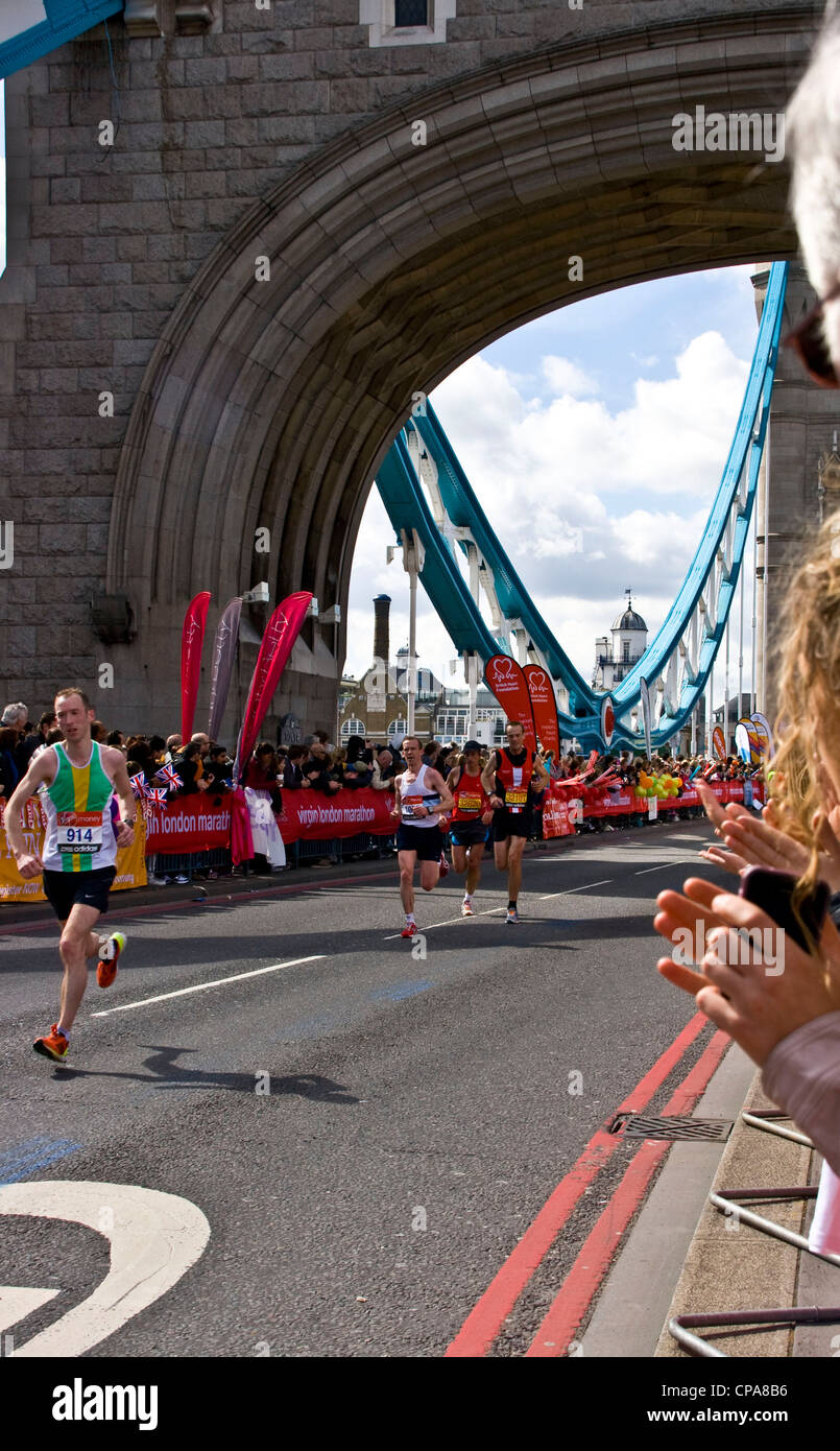 2012 London marathon runners crossing grade 1 listed Tower Bridge ...