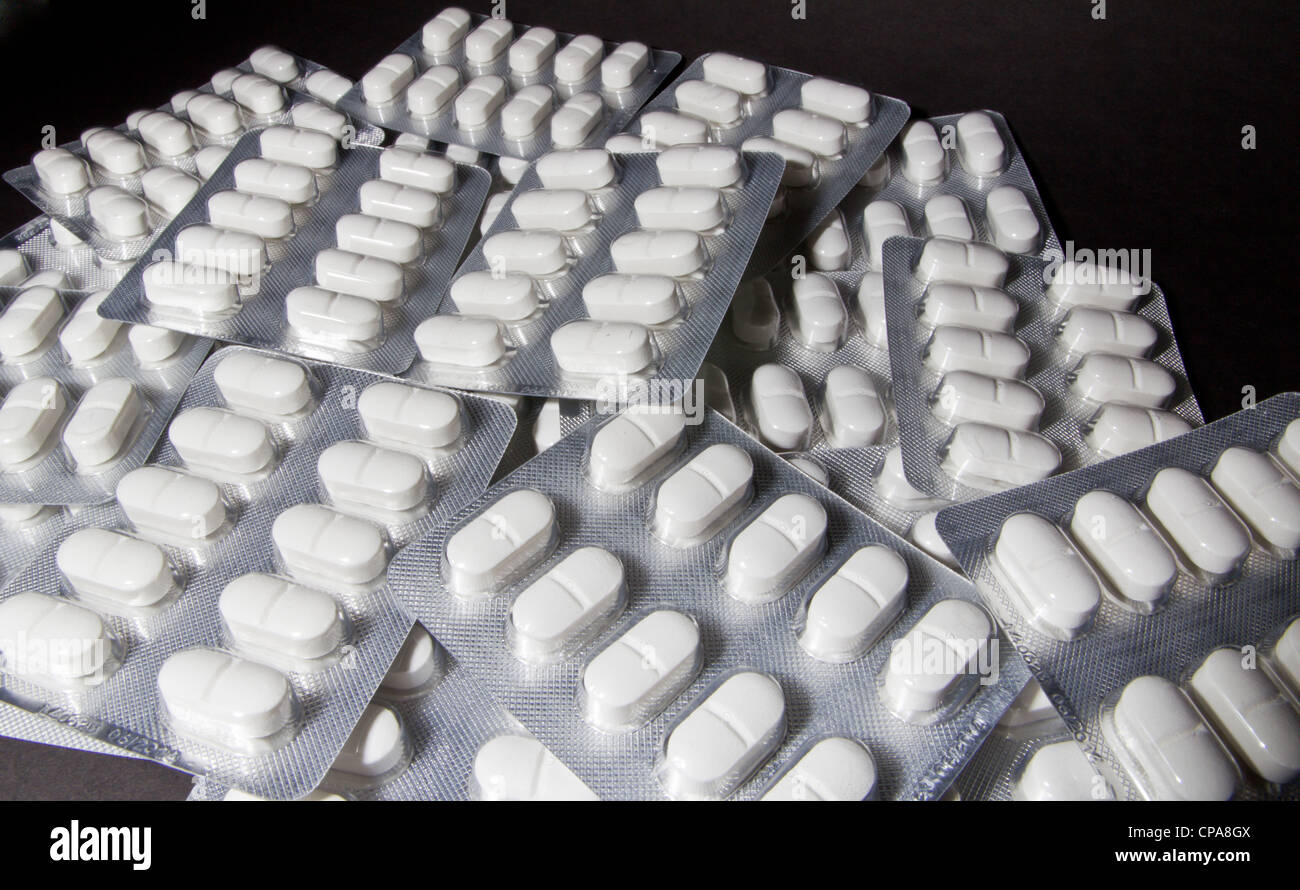 pills in containers Stock Photo - Alamy
