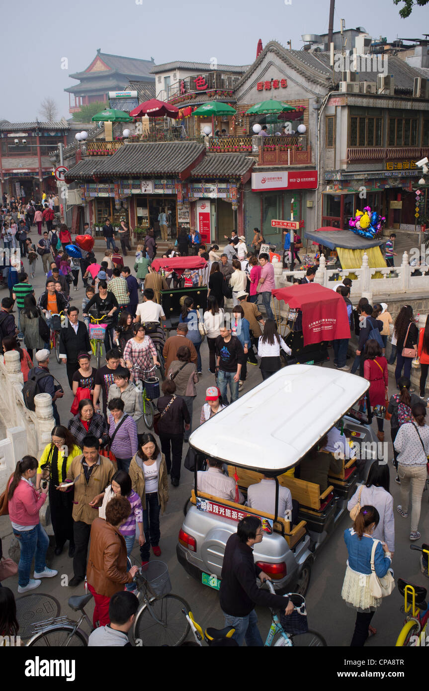 Busy street on historic bridge beside popular tourist location at ...