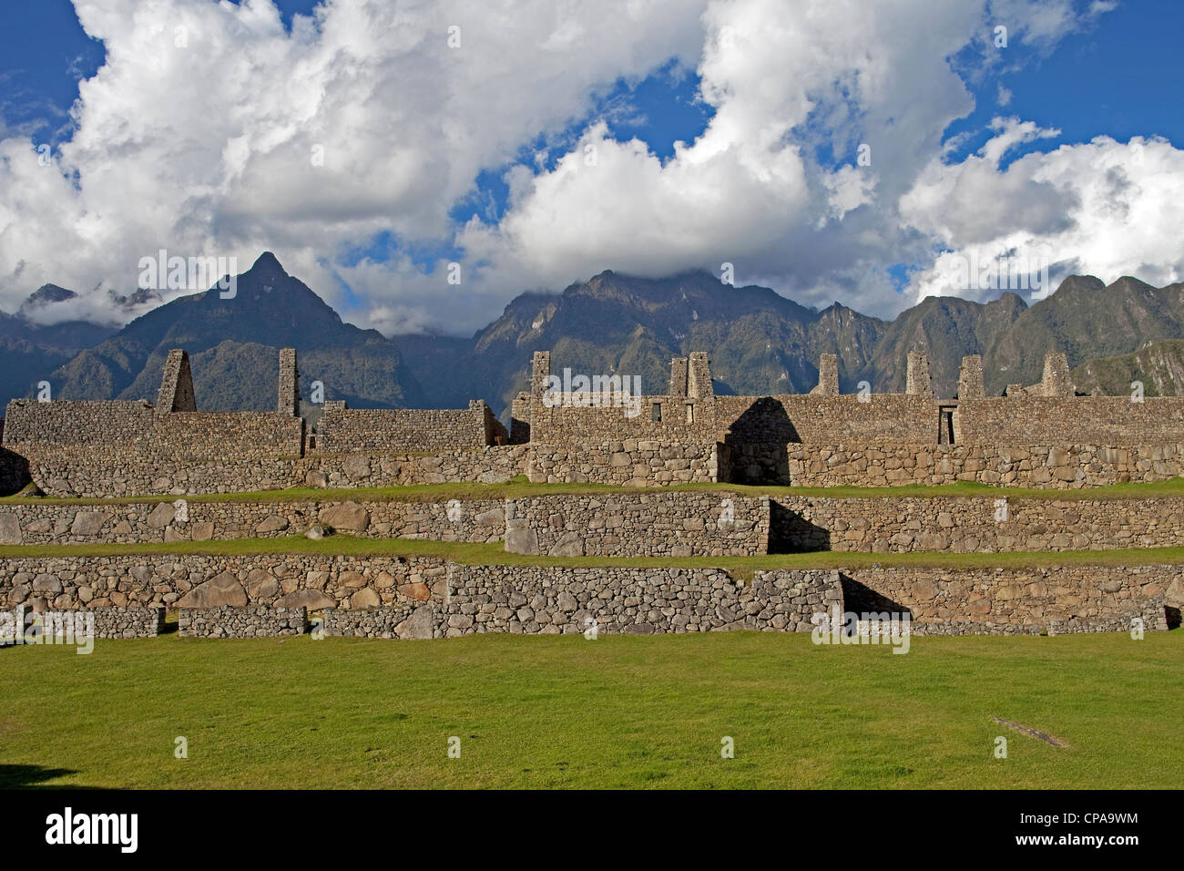 The terraced Inca ruins of Machu Picchu with the Andes Mountains behind ...