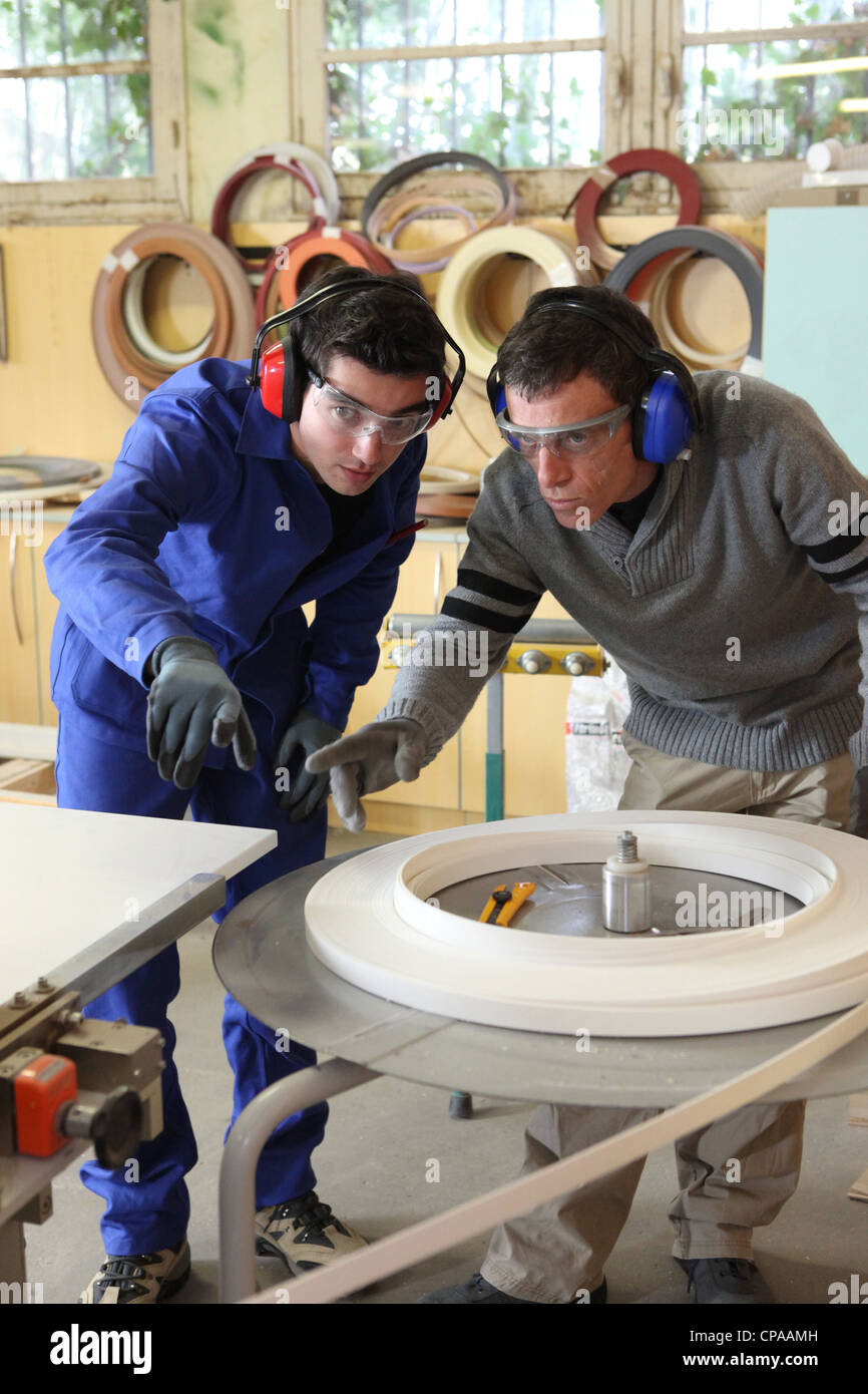 Two factory workers Stock Photo - Alamy