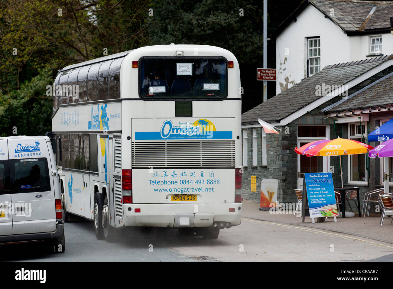 Chinese bus tour Omega Travel Stock Photo - Alamy
