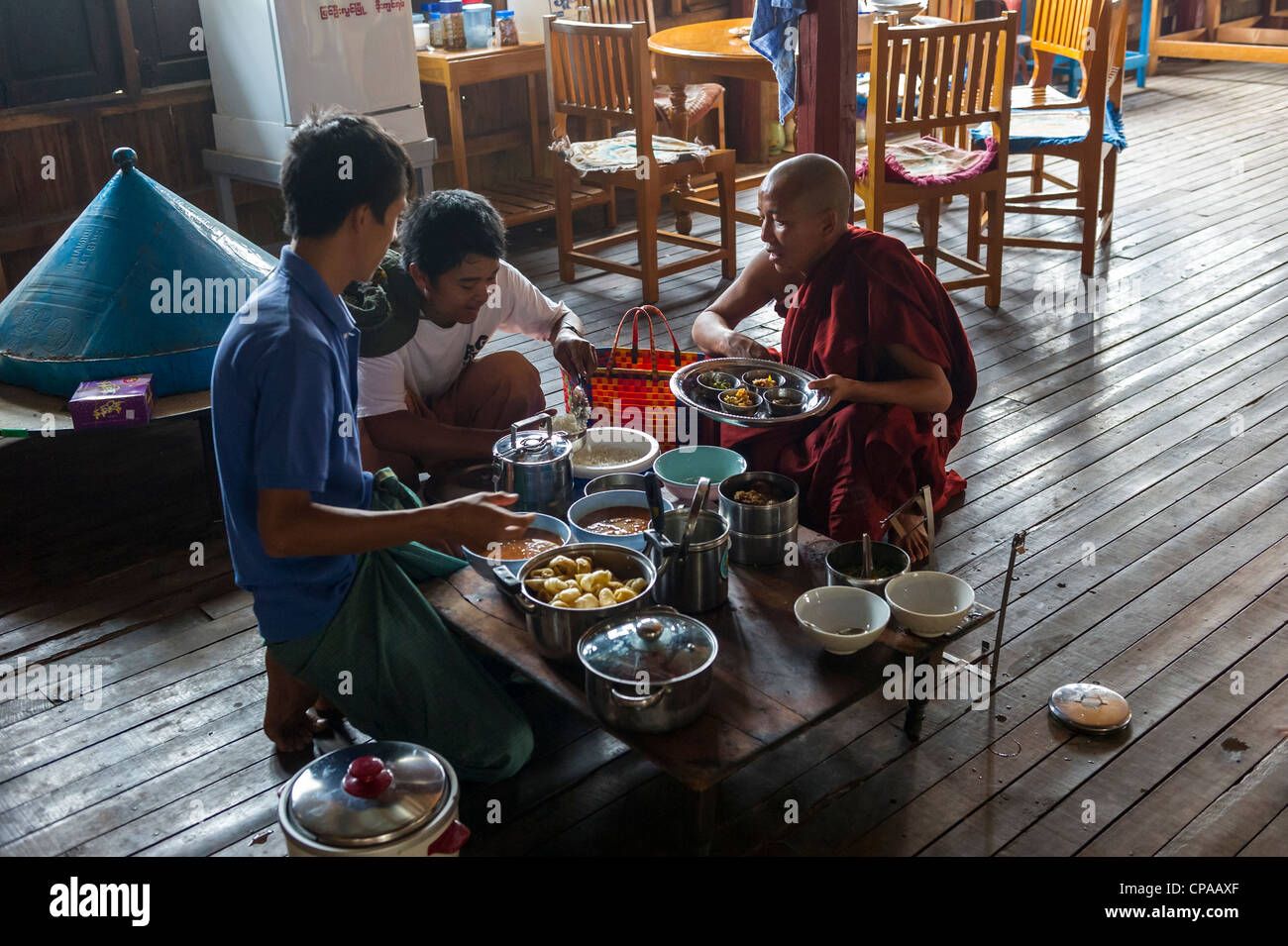 Monk eating at table hi-res stock photography and images - Alamy