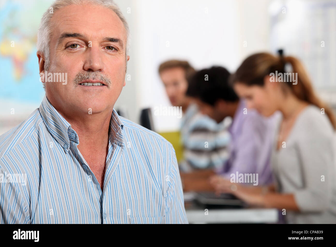 Mature college professor Stock Photo - Alamy
