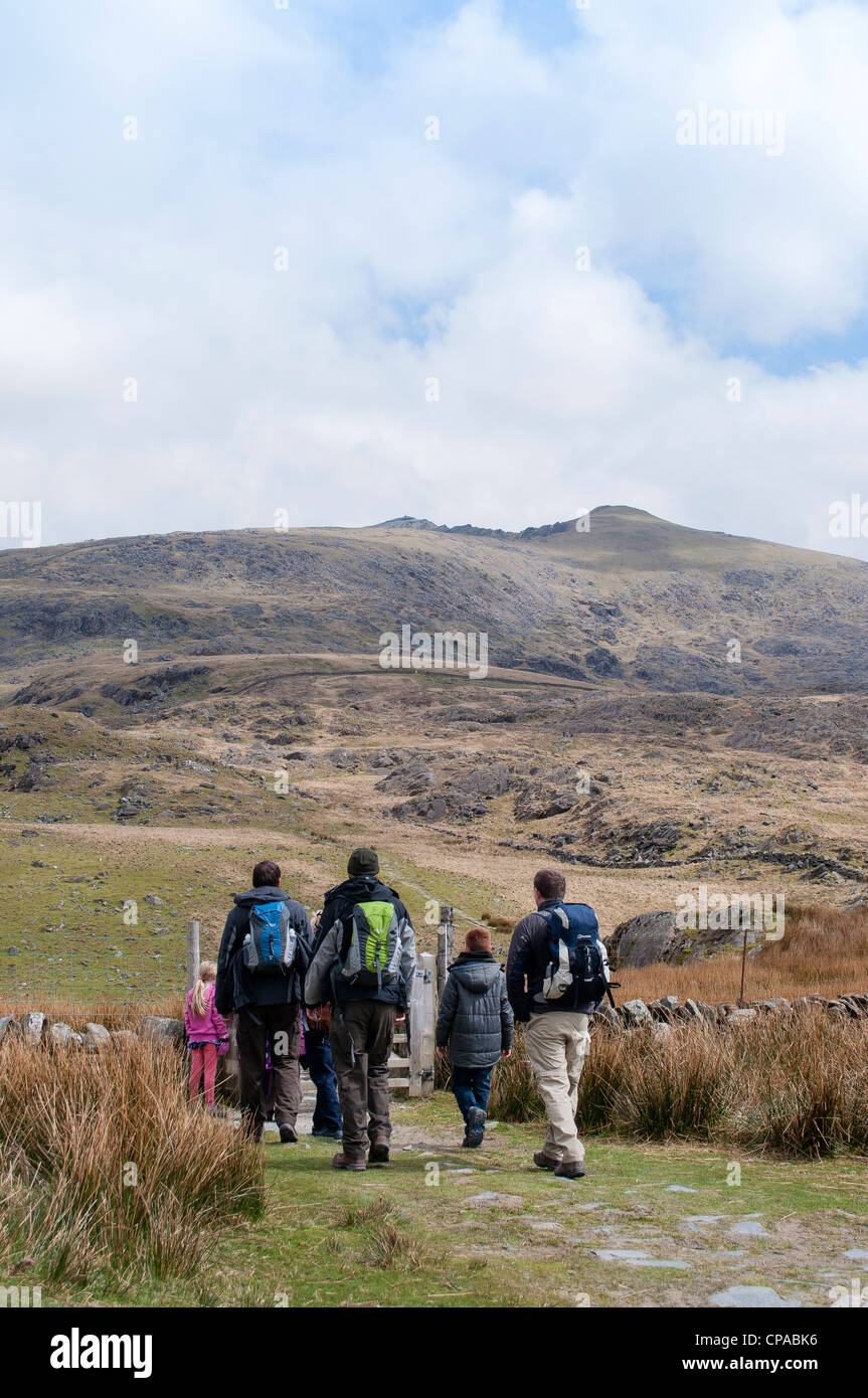 A group of walkers setting off to climb Mount Snowdon in the Snowdonia ...