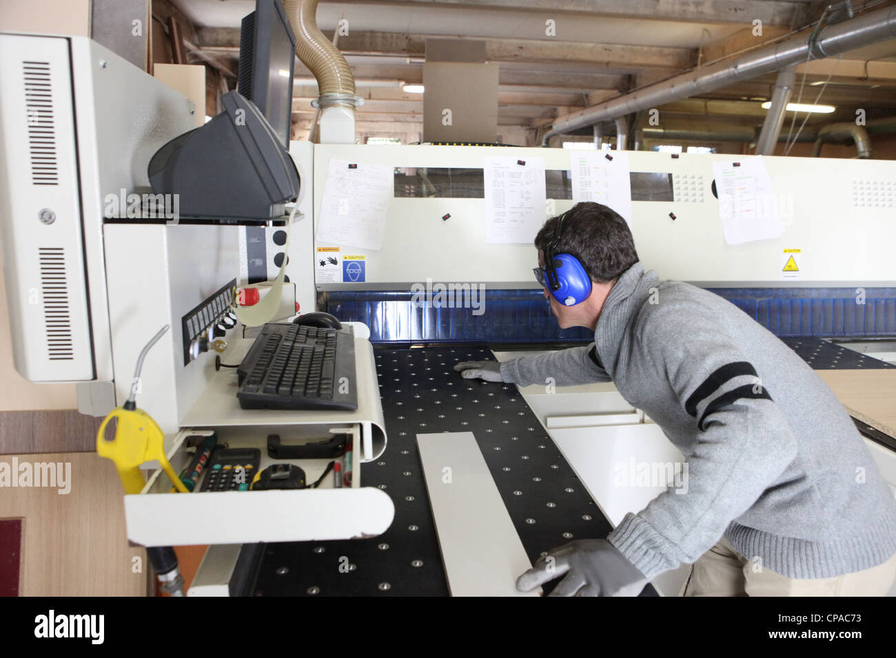 man working in a factory Stock Photo - Alamy