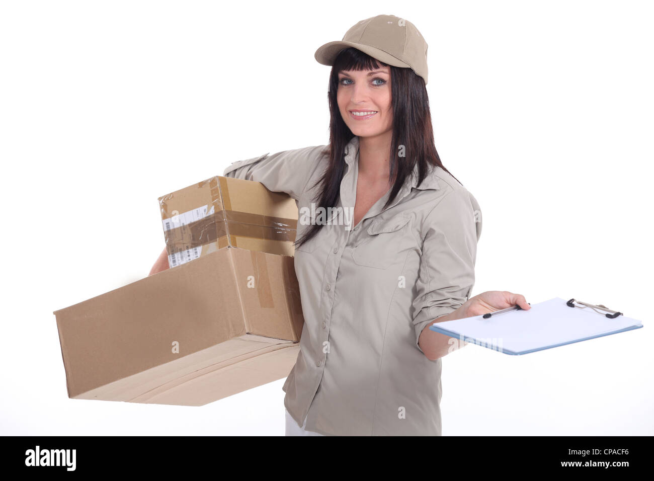 Female courier with parcels and a clipboard Stock Photo - Alamy