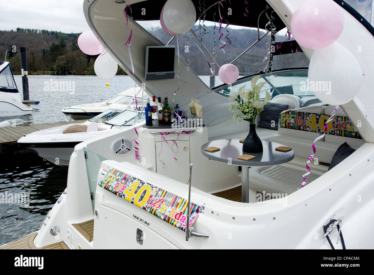 Birthday party boat cruiser on Lake Windermere Stock Photo - Alamy