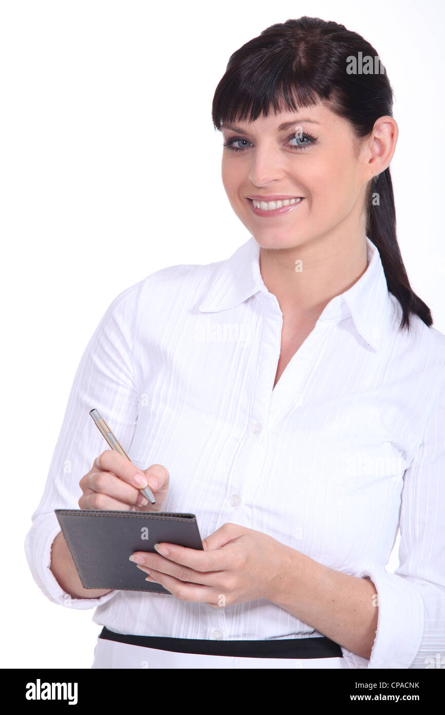 Waitress writing order Stock Photo - Alamy
