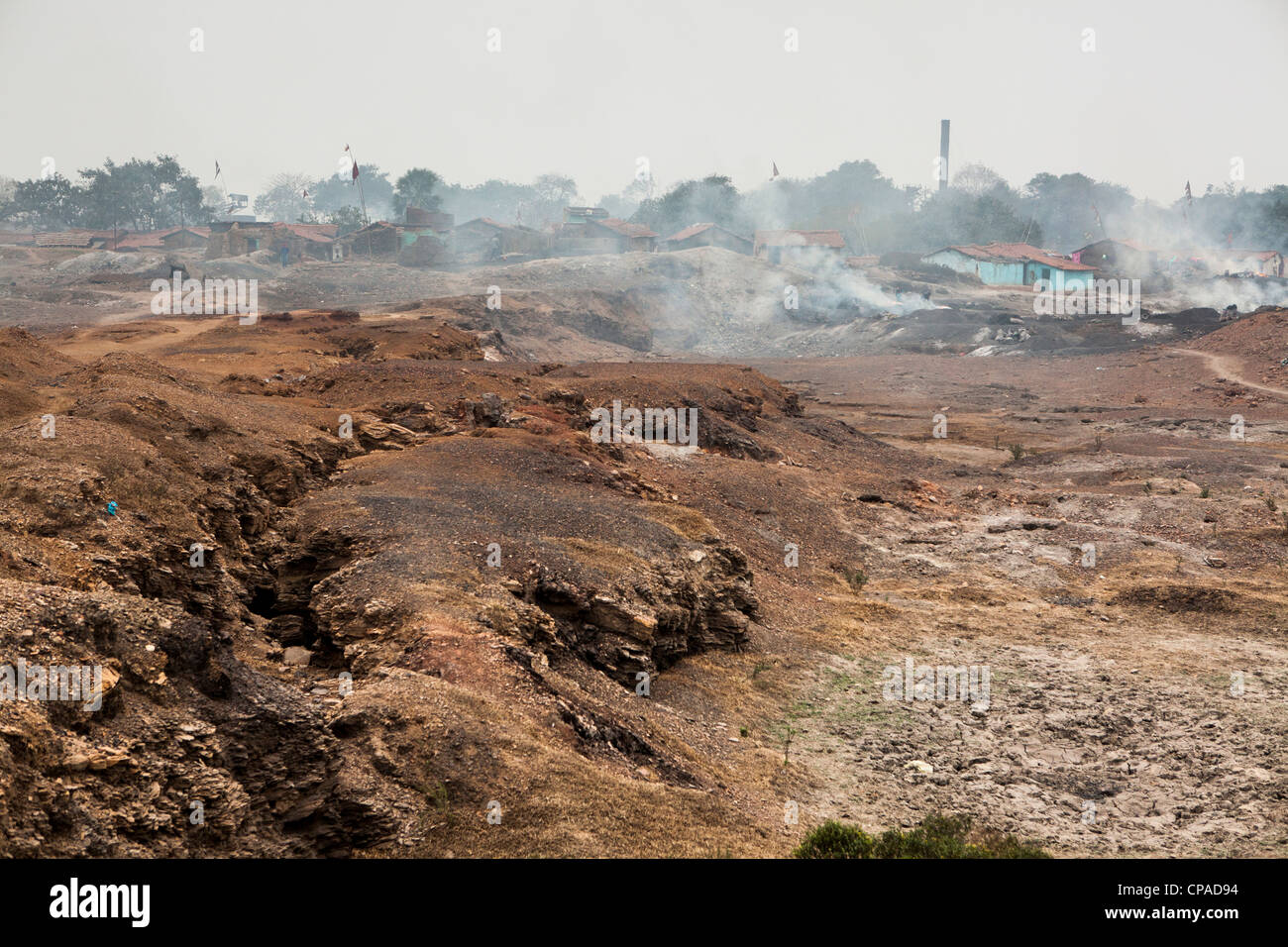 Landscape of Jharia coal field village with burning crack, Jharia ...