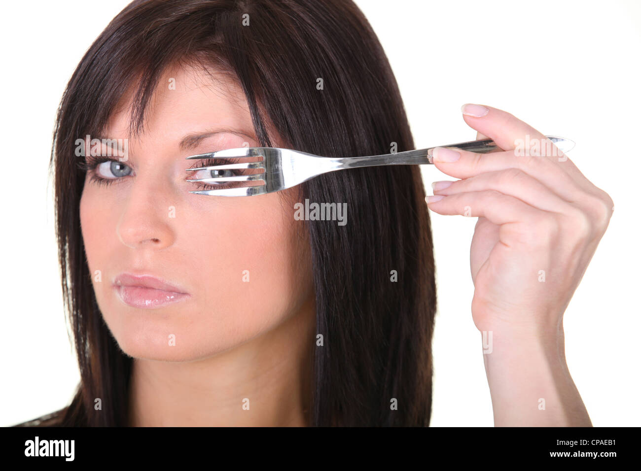 Woman with a fork Stock Photo - Alamy