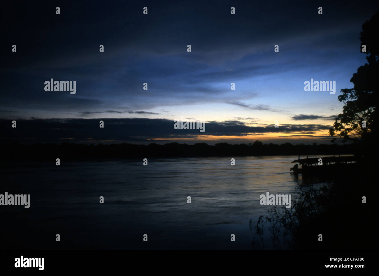 Peru, sunset in Amazon Stock Photo - Alamy