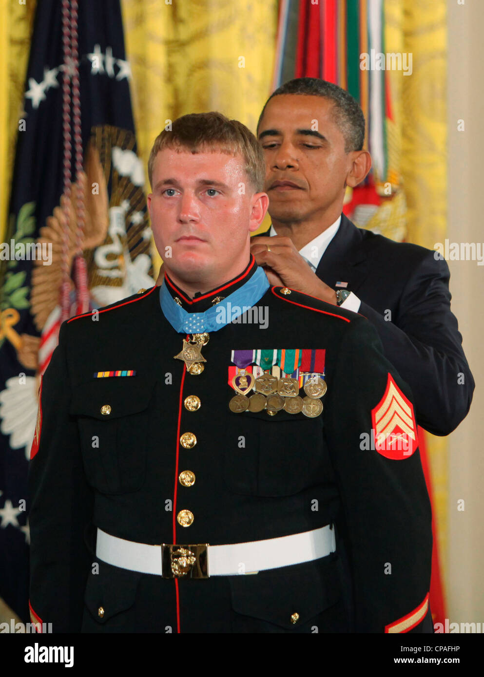President Barack Obama presents the Medal of Honor to former active ...