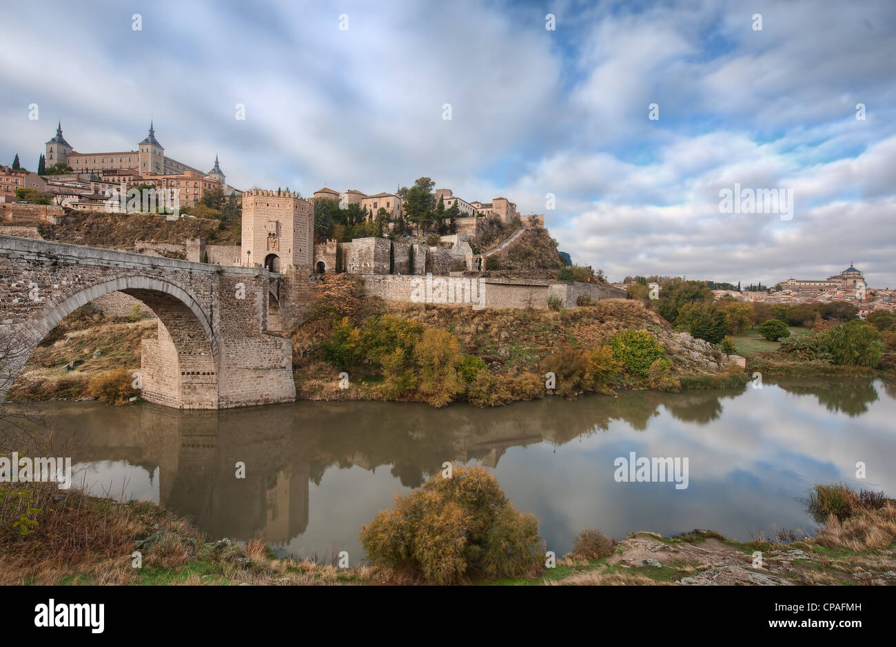 The Alcazar of the ancient city of Toledo in central Spain reflected in ...