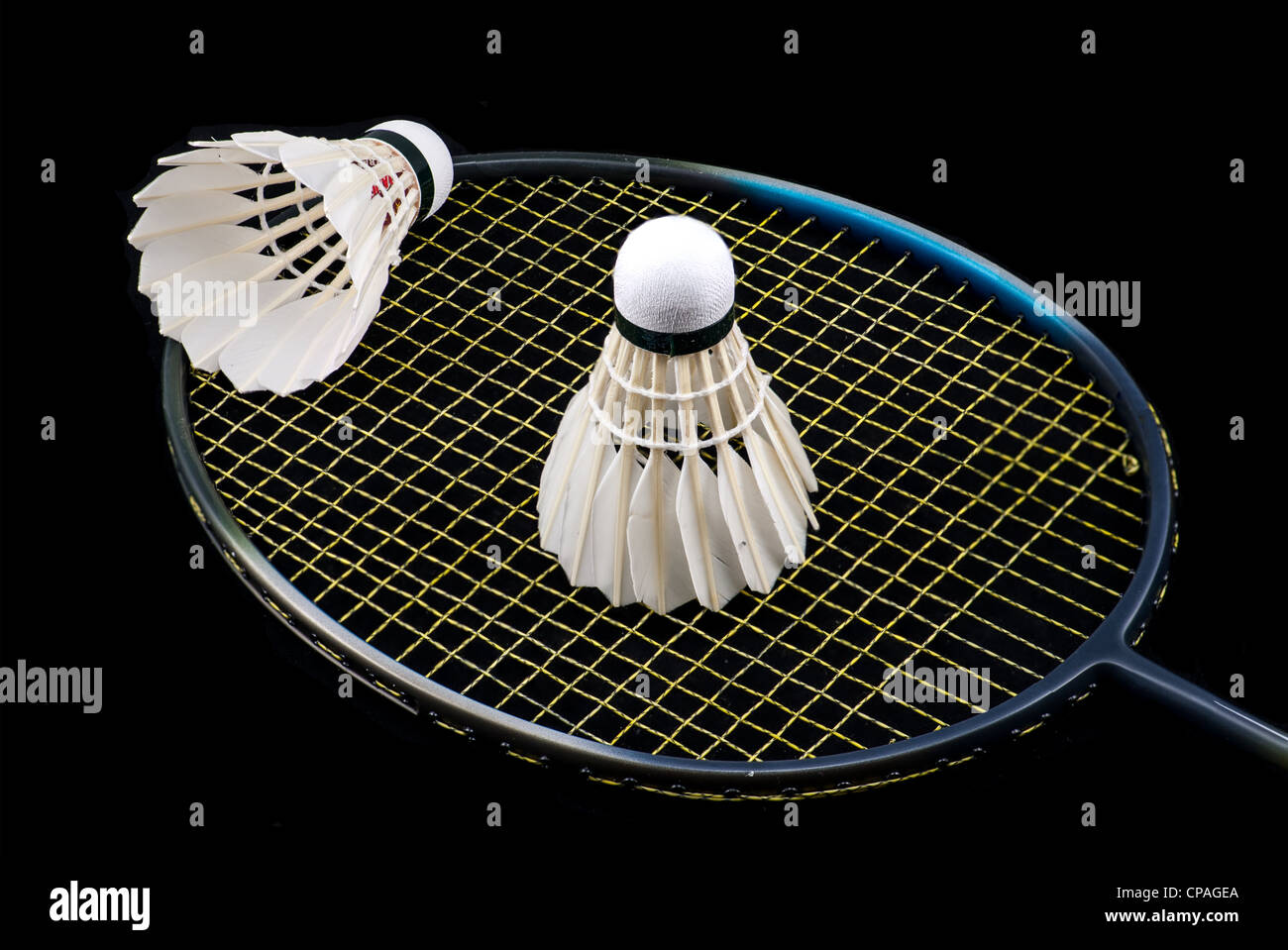 Battledore and shuttlecock on the black background Stock Photo - Alamy