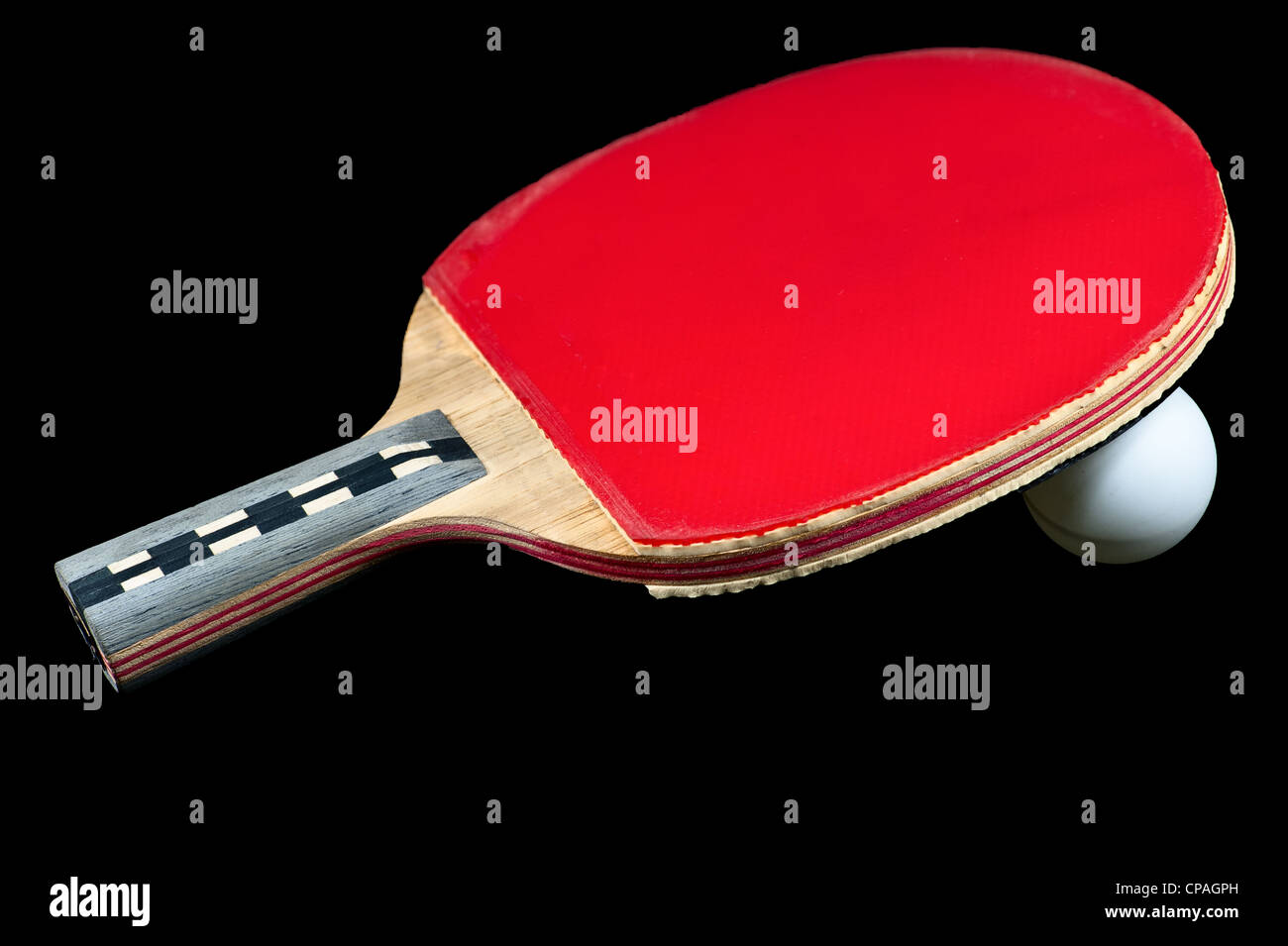 Table tenis racket and ball on the black background Stock Photo - Alamy