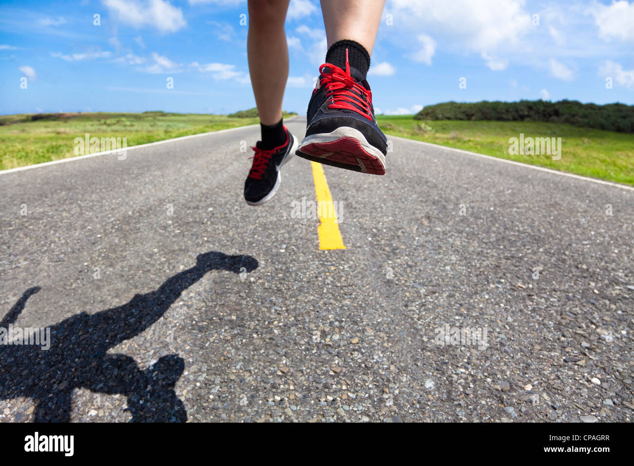 closeup of running legs on the road Stock Photo - Alamy