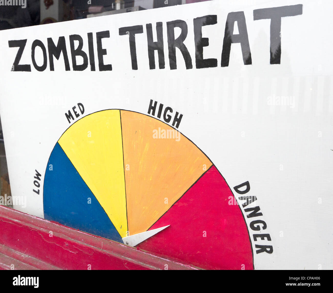 Zombie Threat sign in toy store window, Portland, Oregon Stock Photo ...