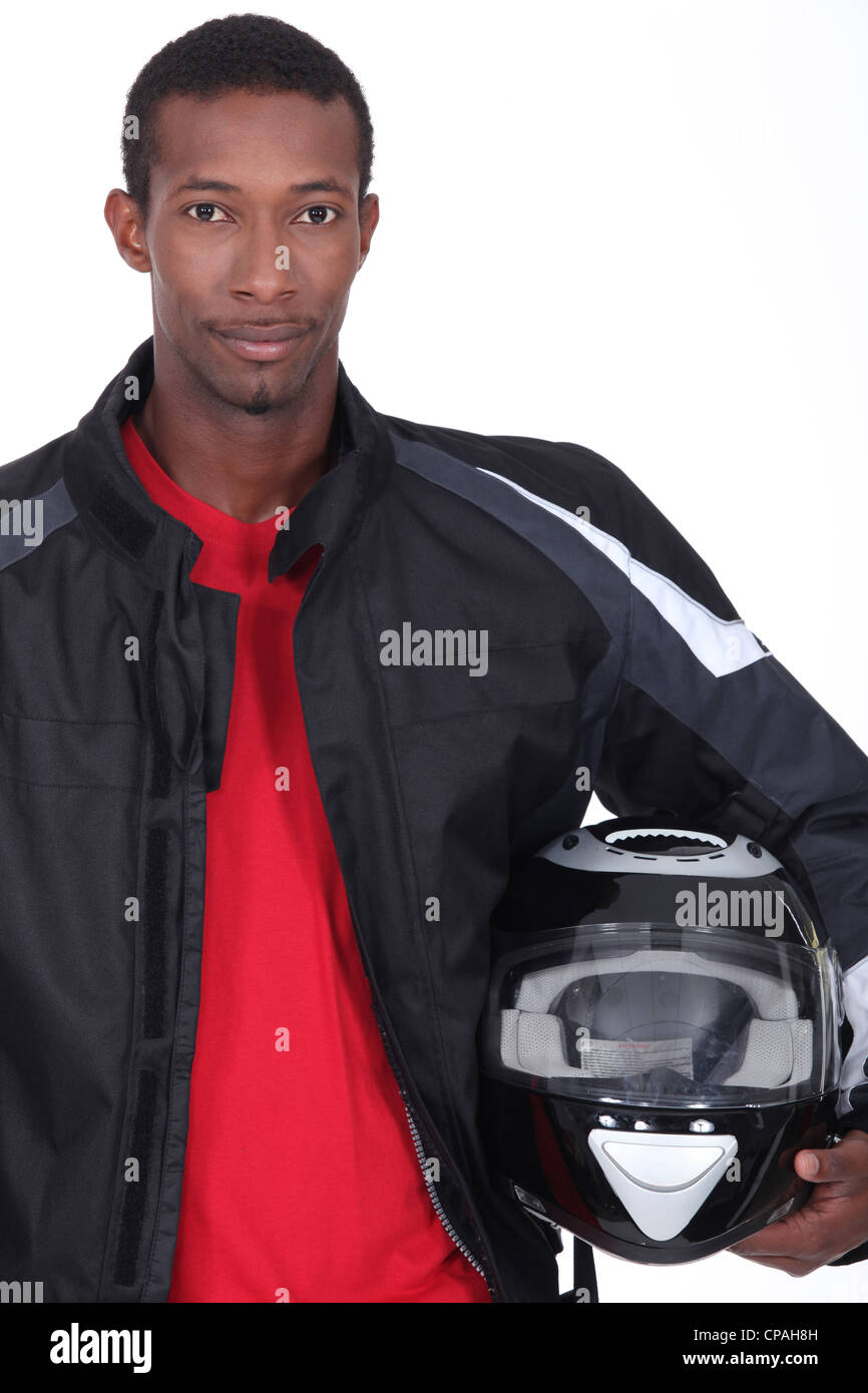 Man with motorcycle helmet Stock Photo - Alamy