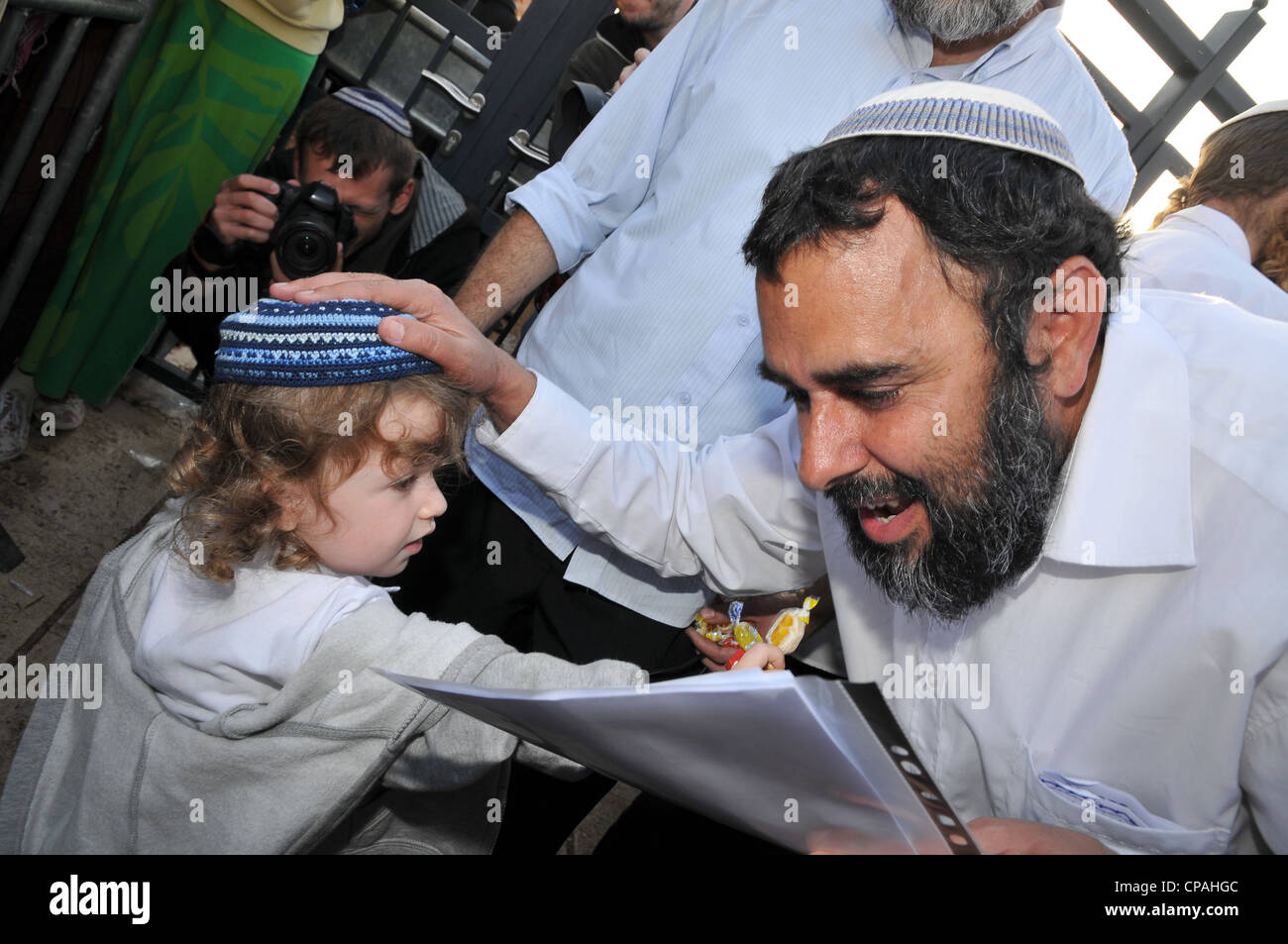 Ultra orthodox men pray at the grave site of Rabbi Shimon Bar Yochai at the holiday of Lag ...