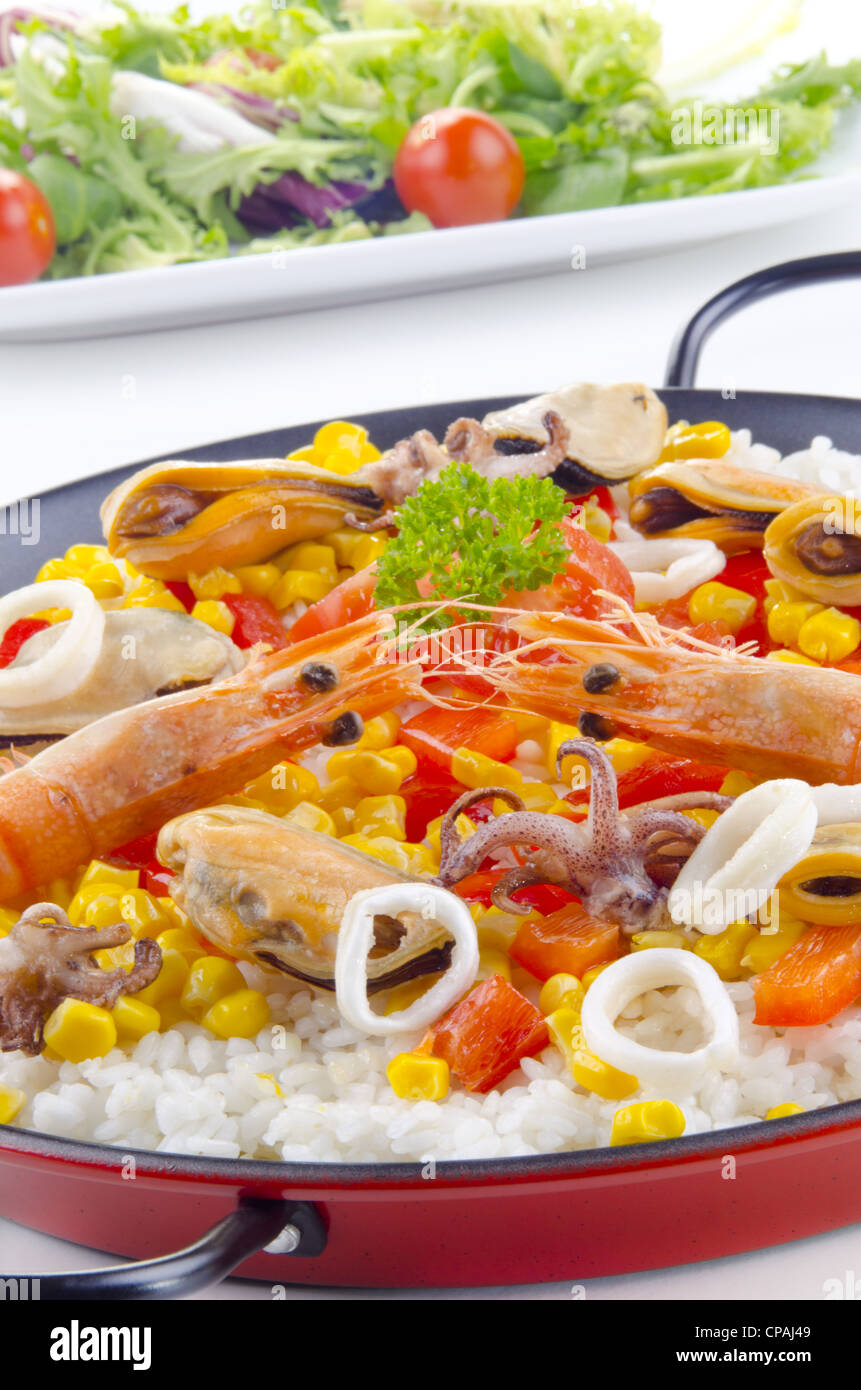 spanish seafood paella with shrimp, mussel and baby squid Stock Photo ...