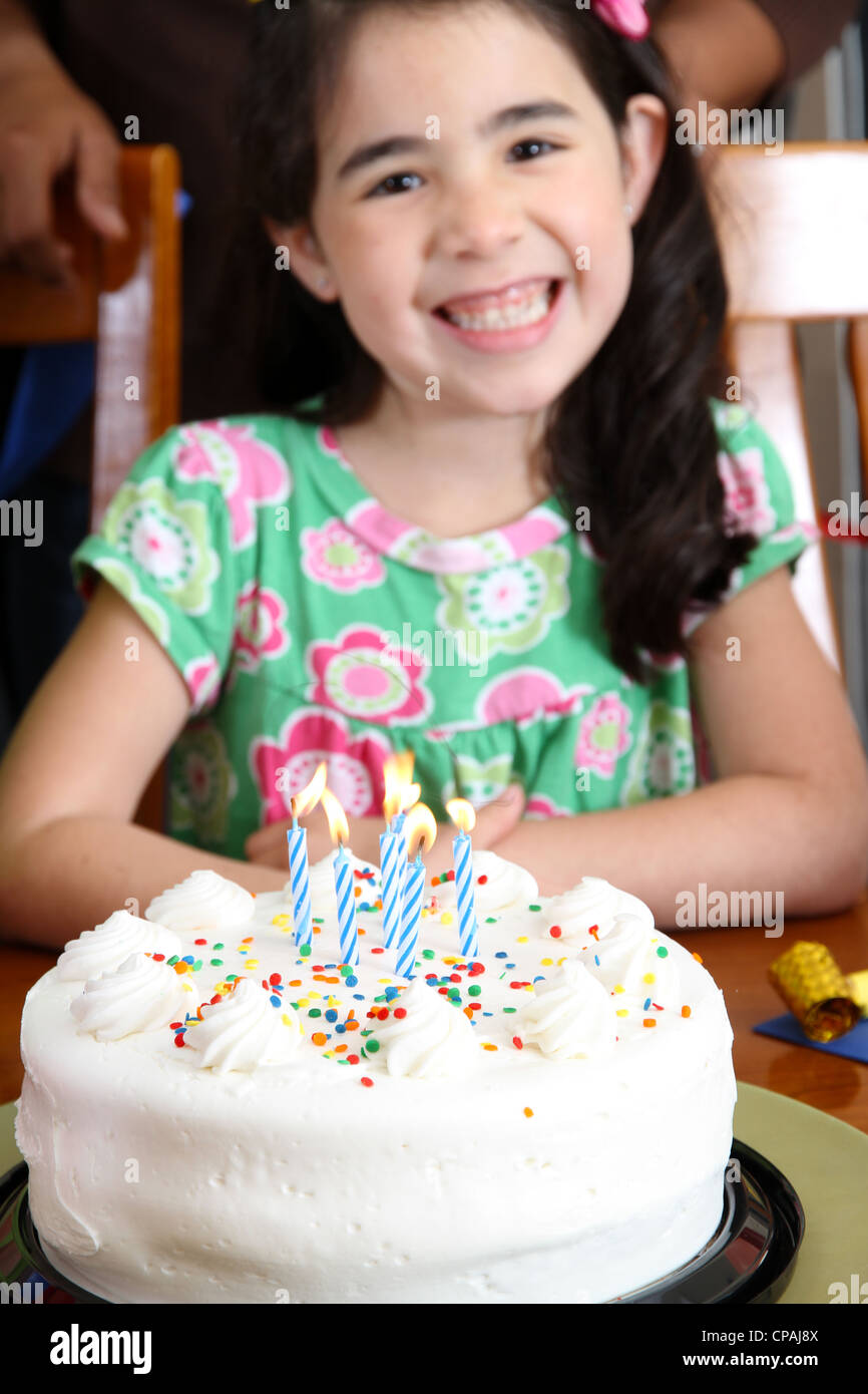 Group enjoying a birthday party for child Stock Photo - Alamy