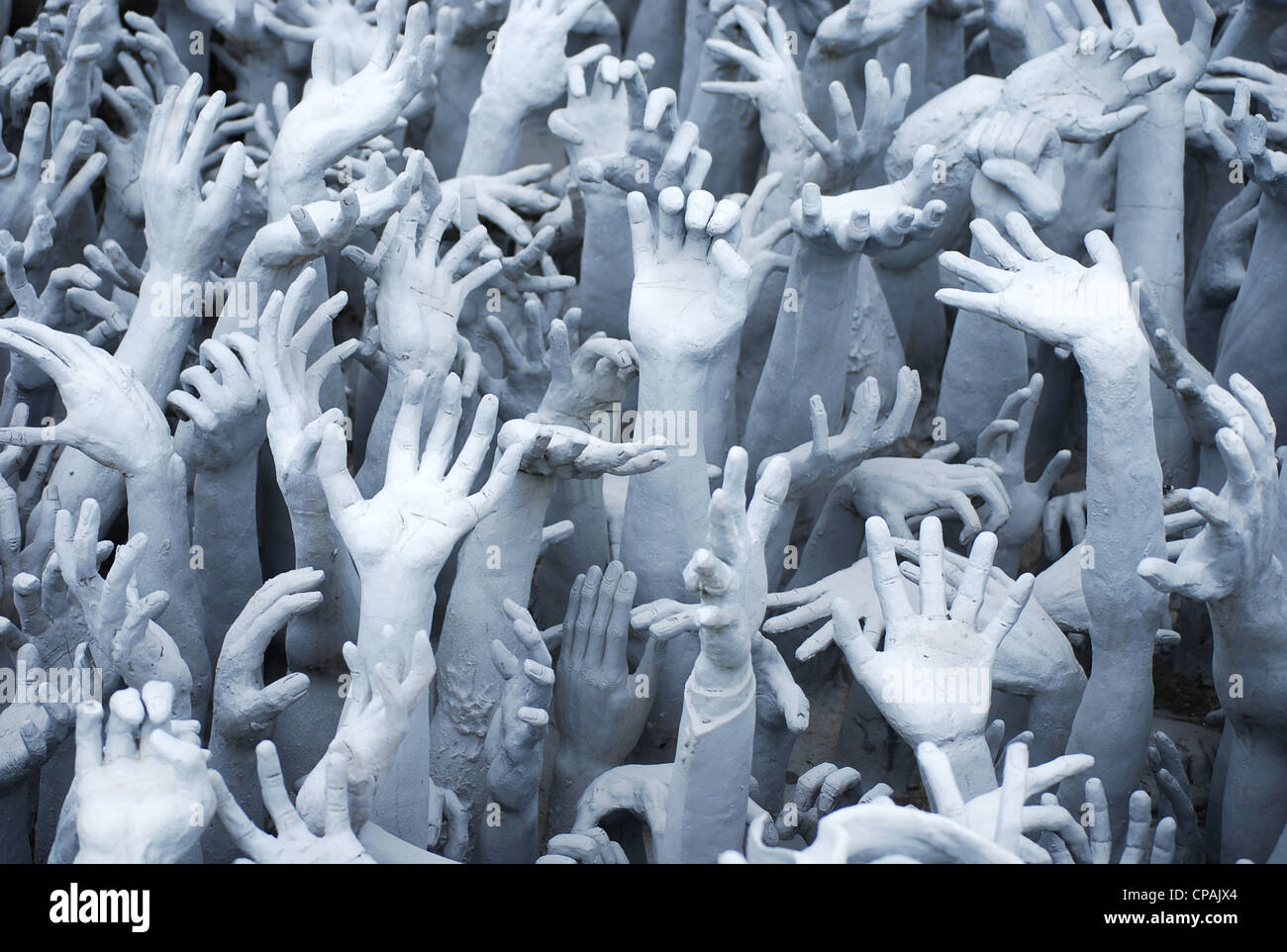 Hands of the hell Stock Photo - Alamy