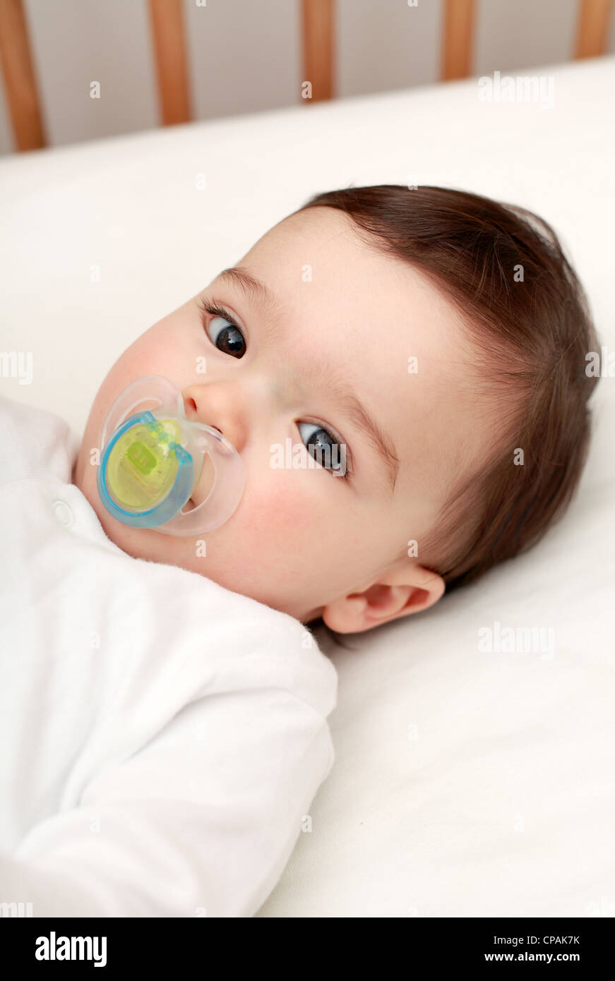Baby sucking on soother hi-res stock photography and images - Alamy