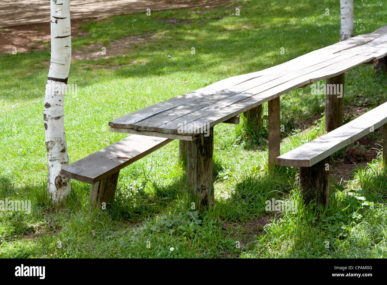 Old wooden bench and table Stock Photo - Alamy