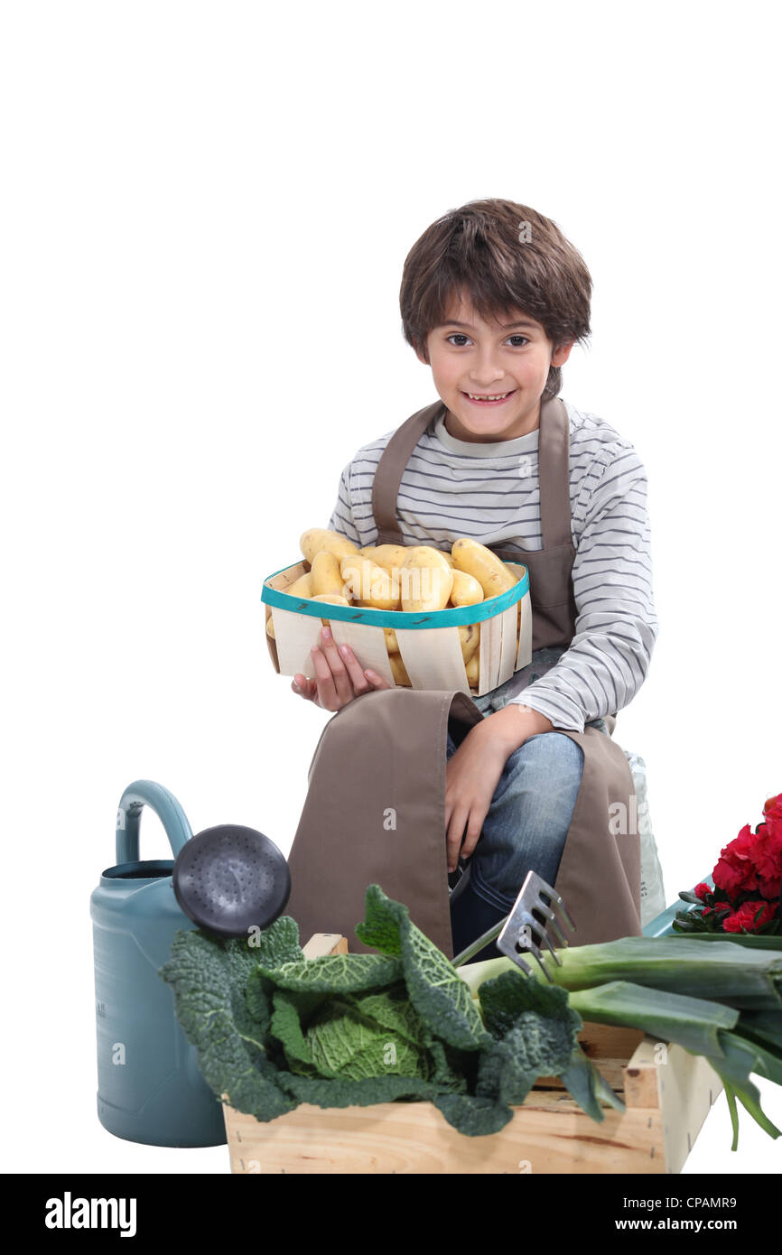 Little boy pretending to be a gardener Stock Photo - Alamy