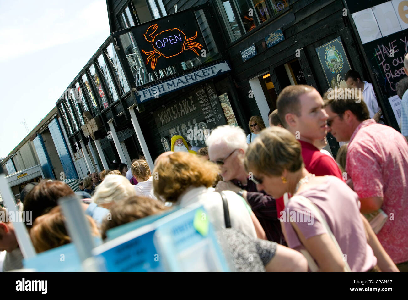 Visitors to Whitstable Harbour and Fish Market, Kent, England, UK Stock ...