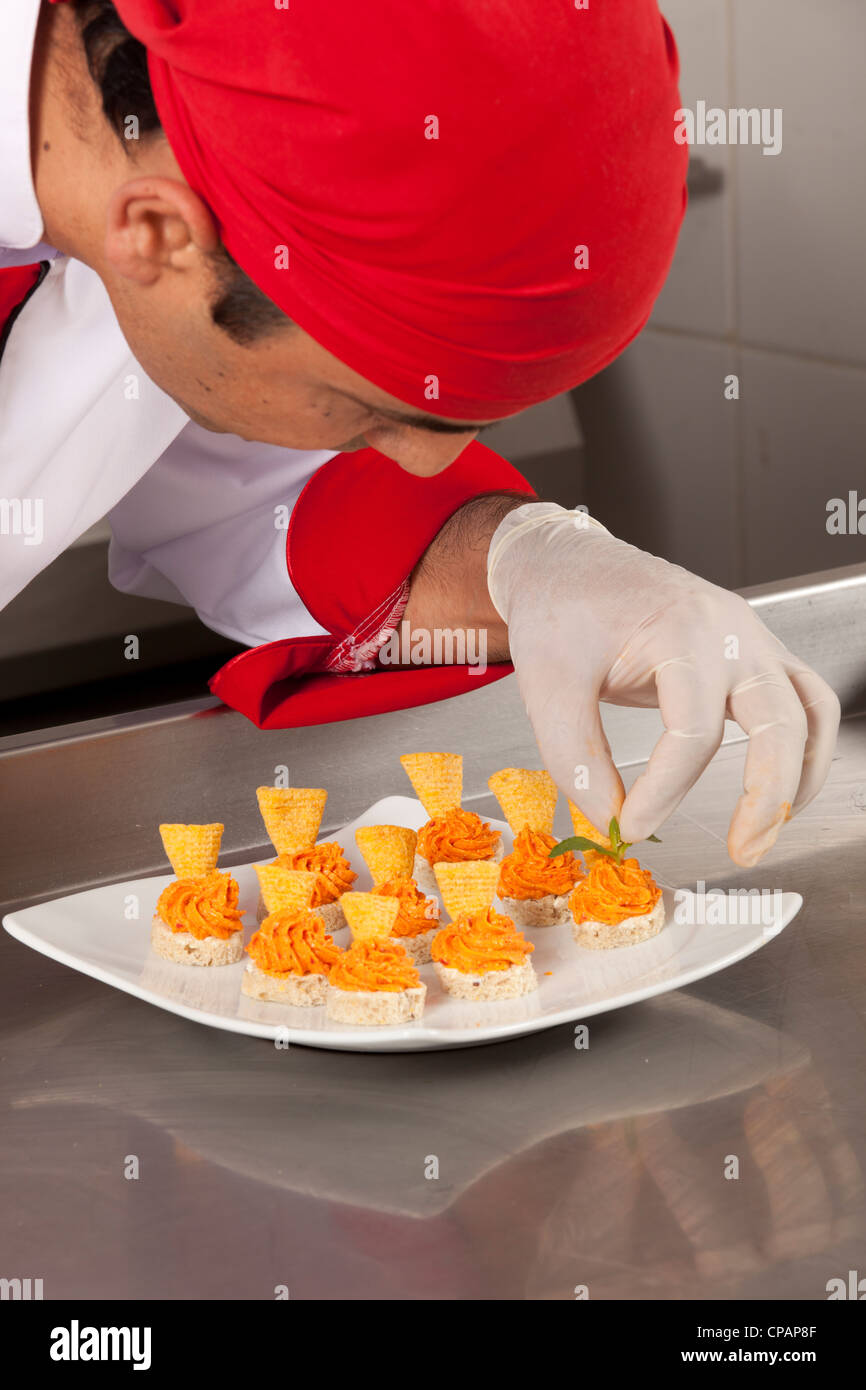 Restaurant chef preparing canapes hi-res stock photography and images ...