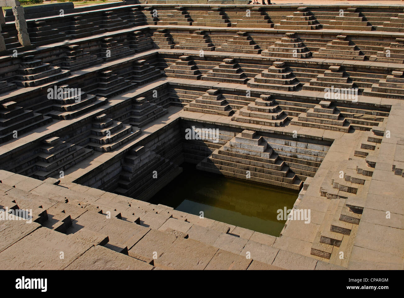 pushkarni stepped tank,hampi, india. hampi is a unesco world heritage ...