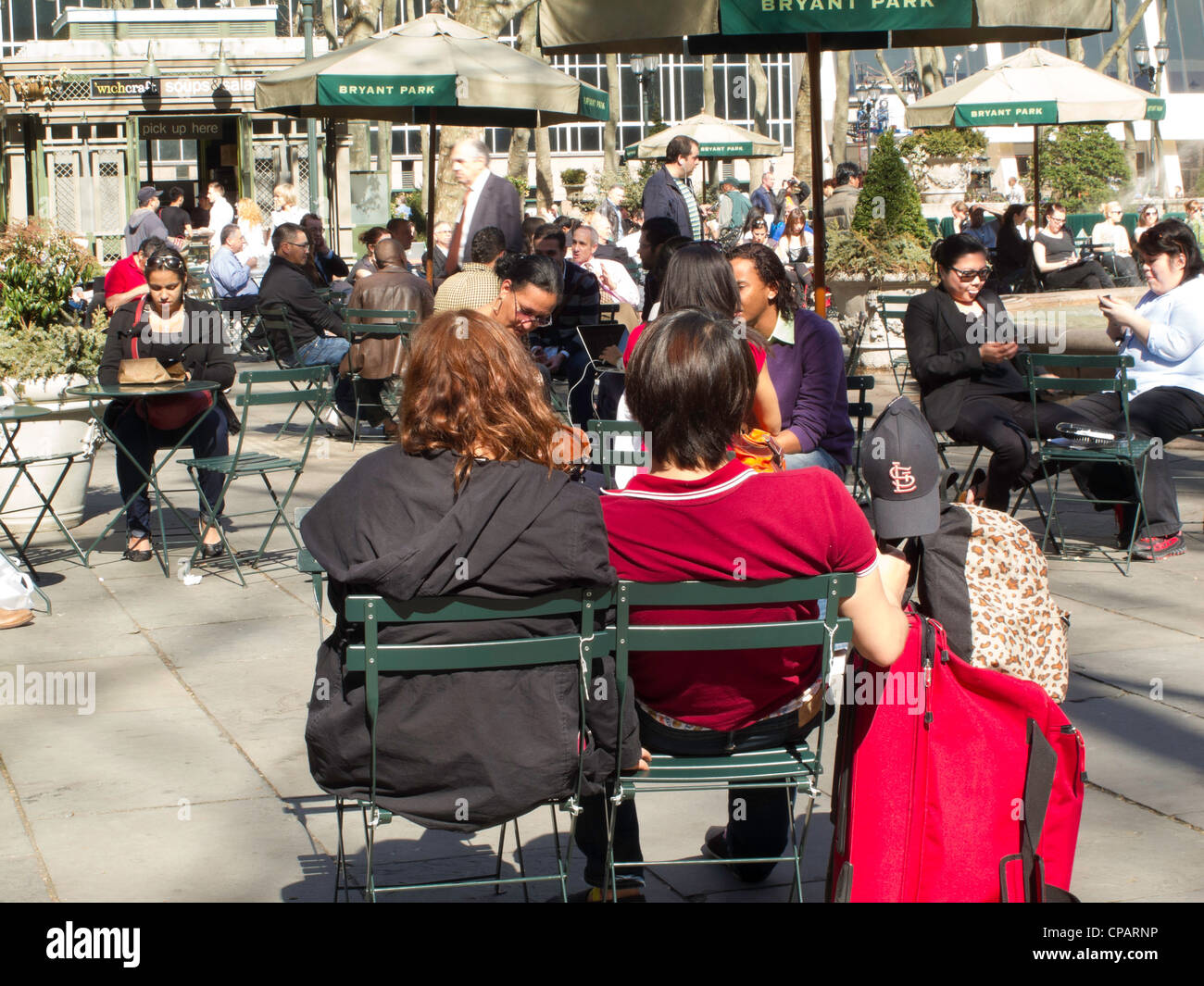 People Enjoying Springtime Day, Bryant Park, NYC Stock Photo - Alamy