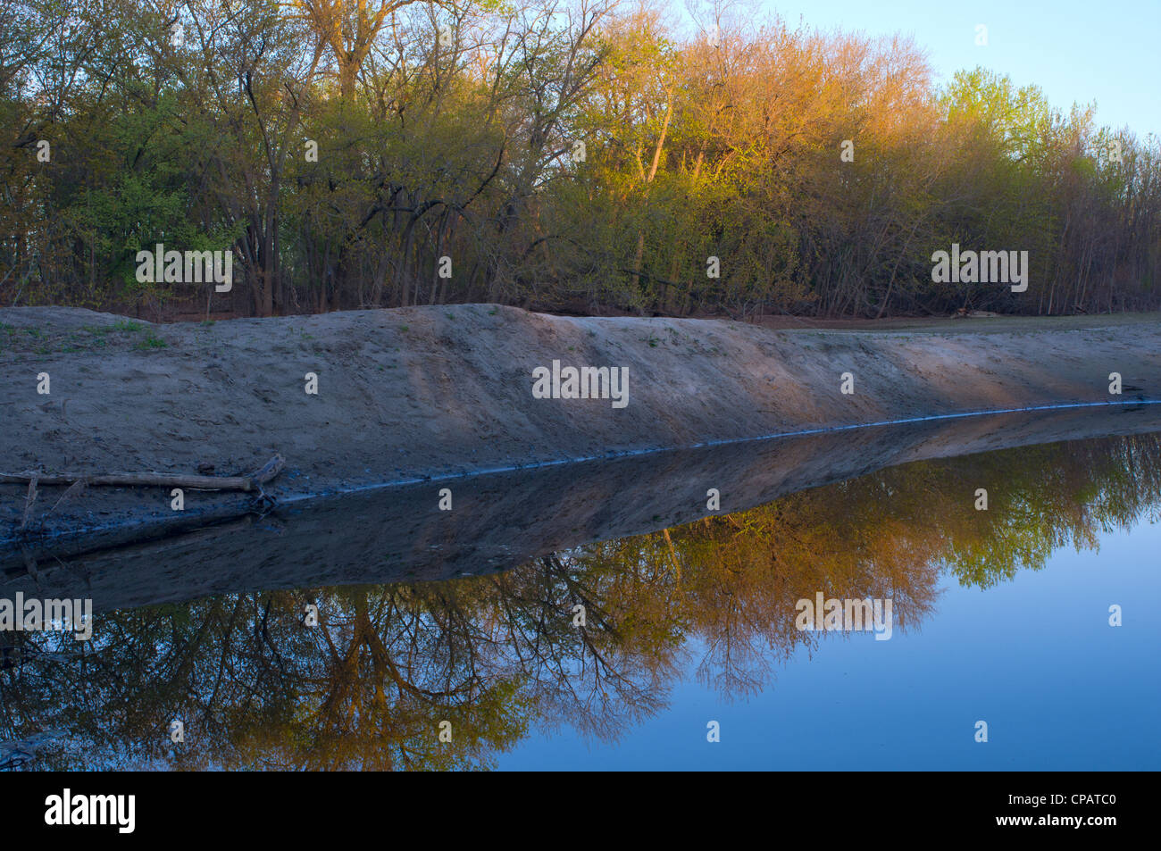 Sunrise along river and banks inside forests of Fort Snelling State ...