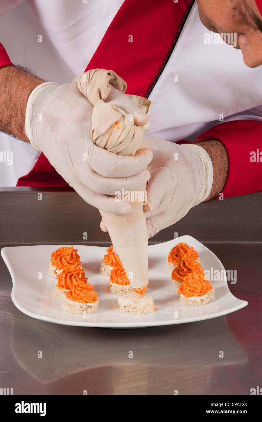 Restaurant chef preparing canapes hi-res stock photography and images ...