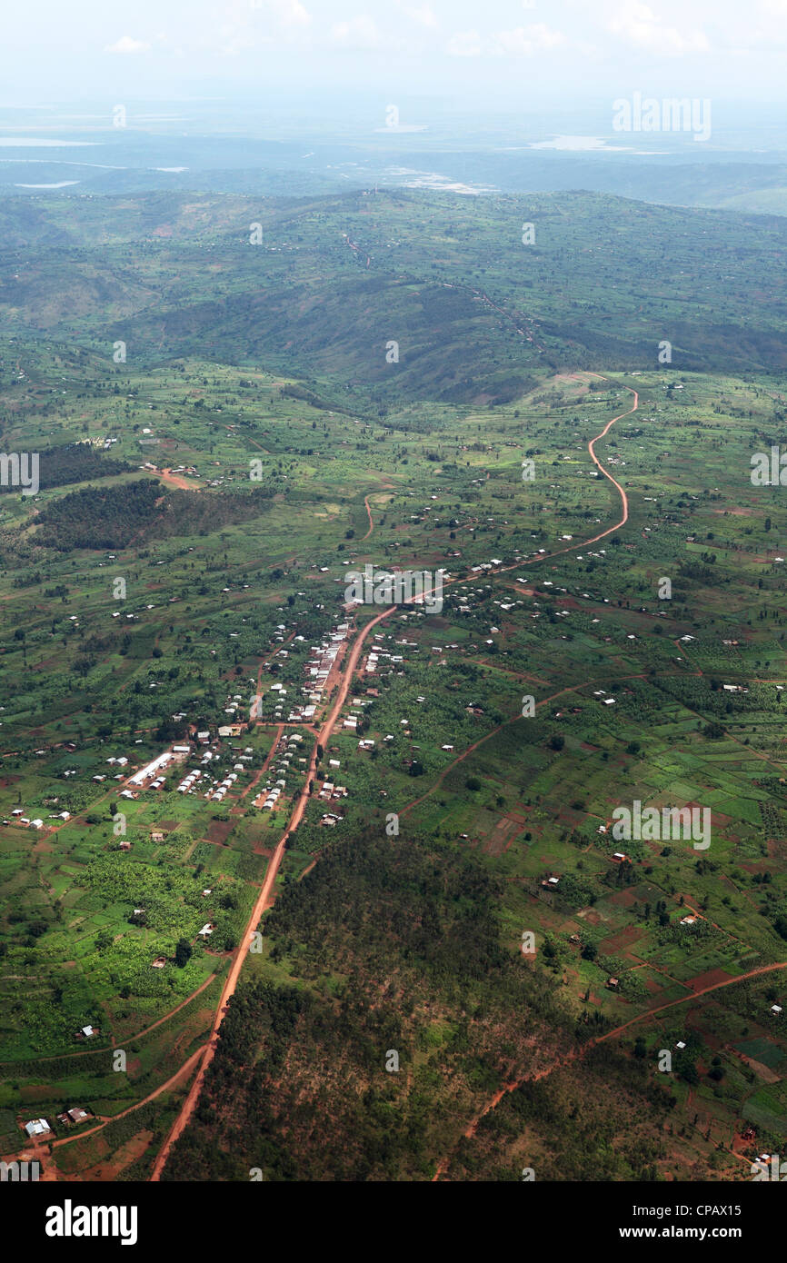 Aerial view of buildings and settlements along a road on the outskirts ...