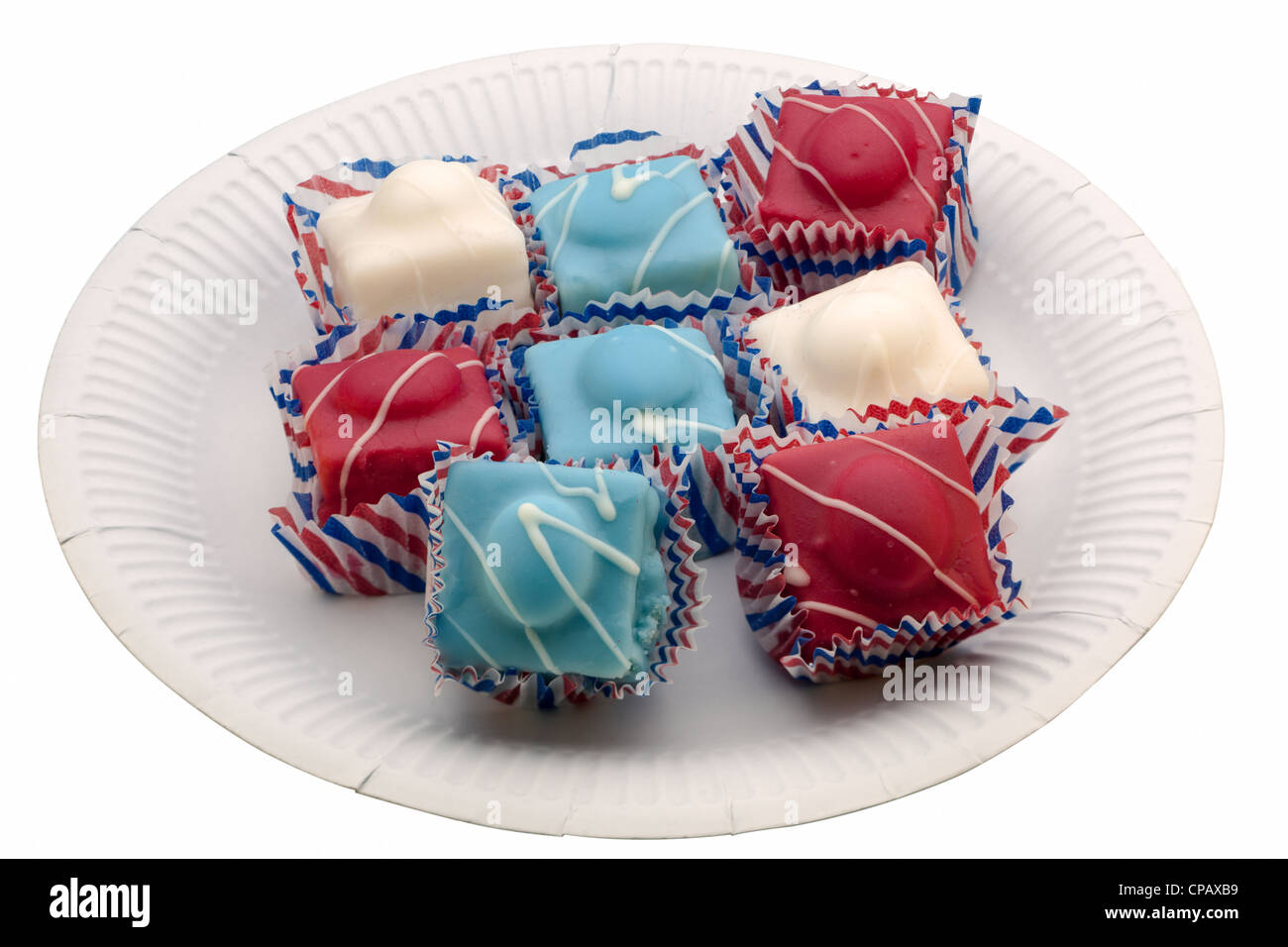 Fancies small iced cakes Stock Photo - Alamy