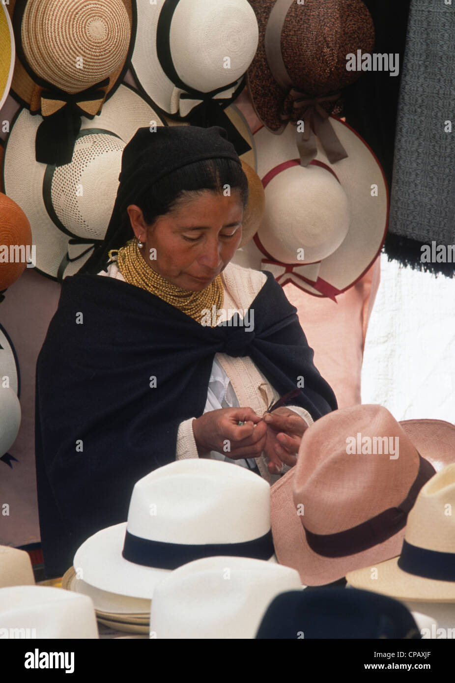 Ecuador, Otavalo, market, vendor of hats Stock Photo - Alamy
