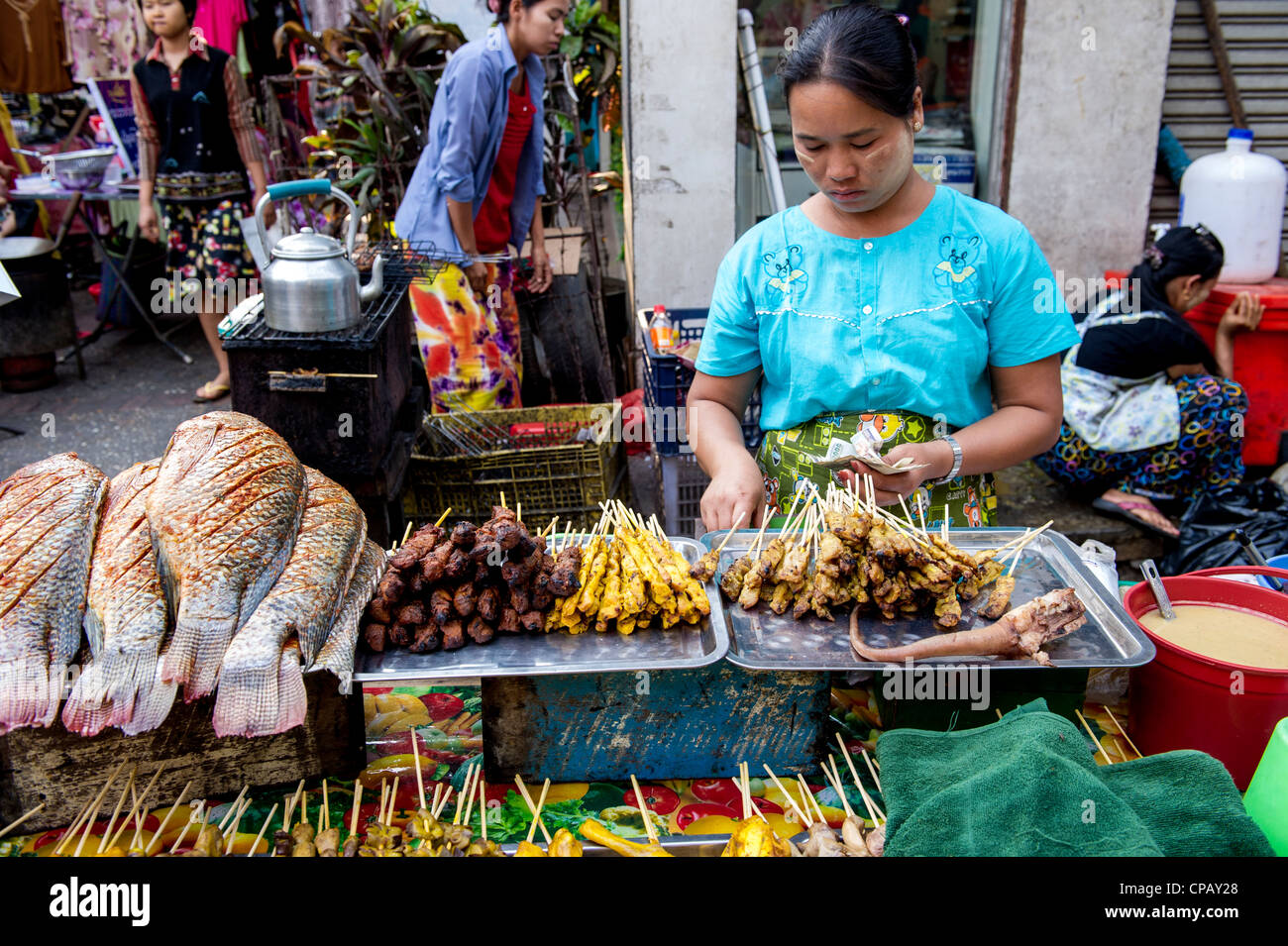 Fish vendor in Yangon, Myanmar Stock Photo - Alamy
