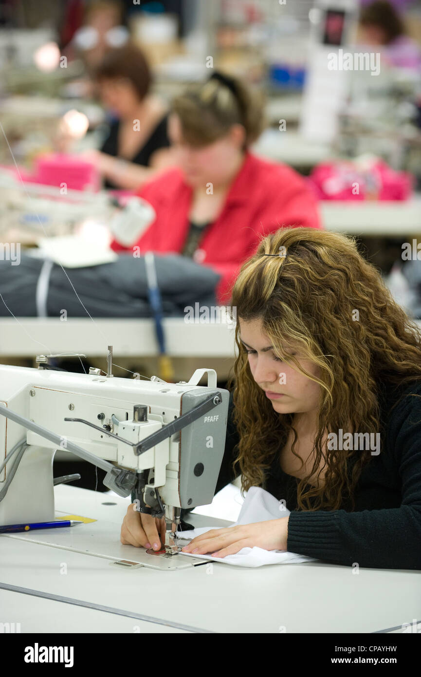 A female trainee tailor at a sewing machine, Burladingen, Germany Stock ...
