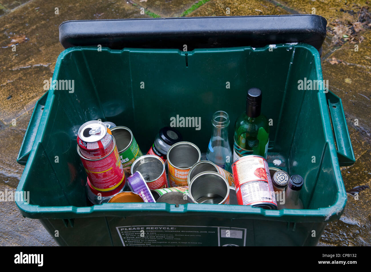 Recycling bin for tins, glass, bottles and cans Stock Photo - Alamy