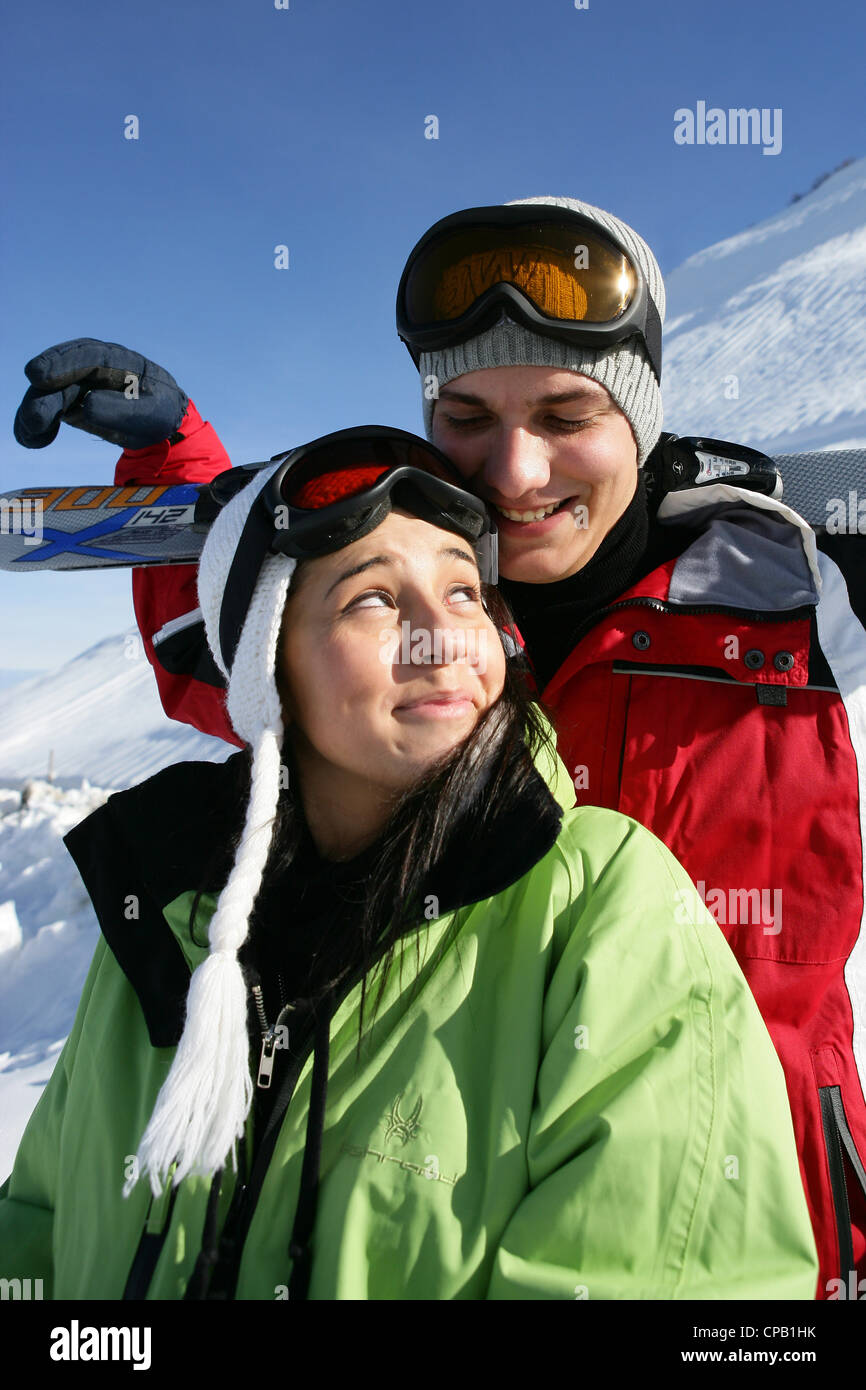 Boy and girl at ski resort Stock Photo - Alamy
