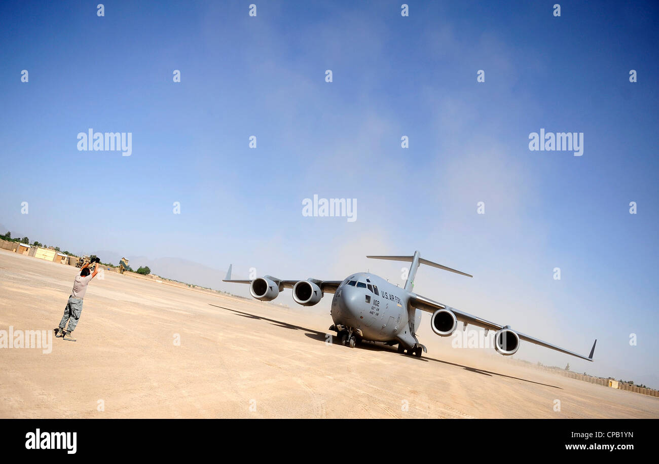 A U.S. Air Force C-17 "Globemaster III" cargo plane taxis to the terminal after landing at the ...