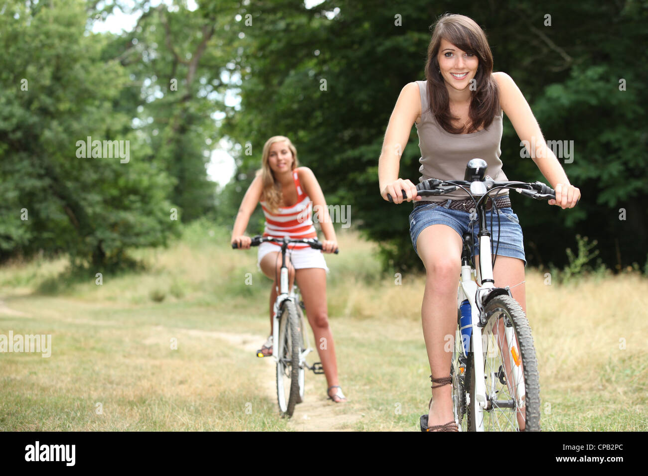 girls on bikes Stock Photo - Alamy
