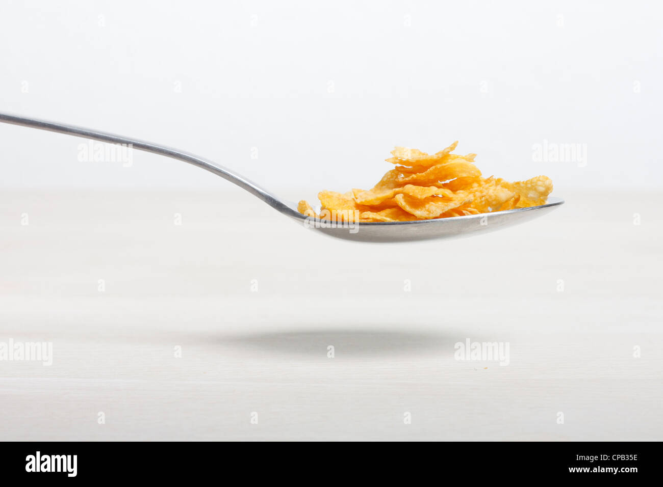 A spoonful of cornflakes Stock Photo - Alamy