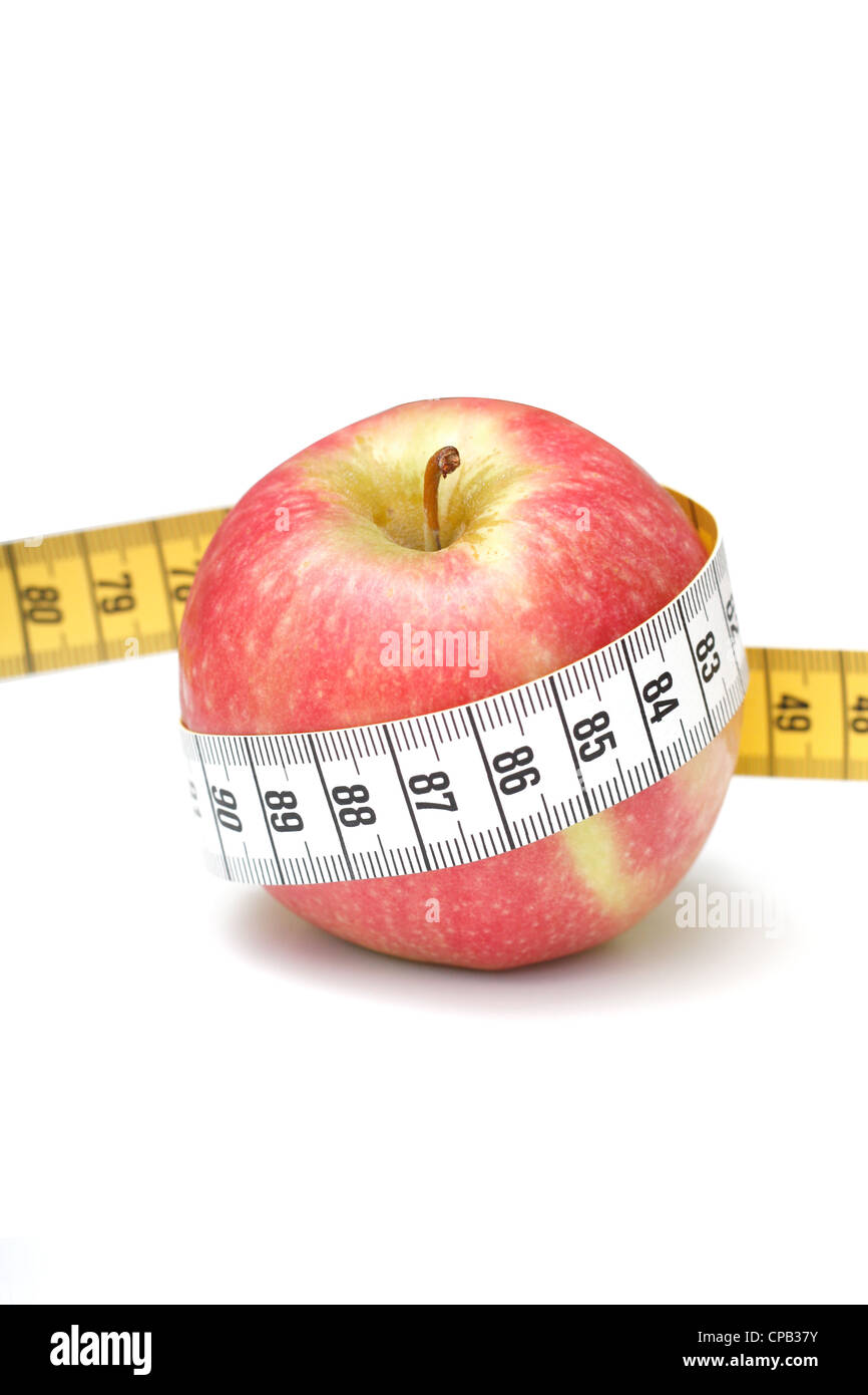 An apple measured with tape measure Stock Photo - Alamy