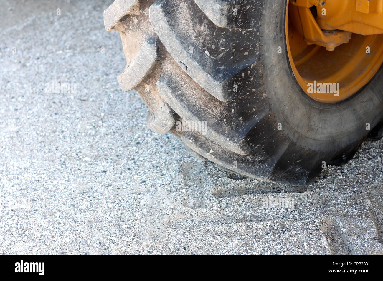 A huge excavator wheel Stock Photo - Alamy